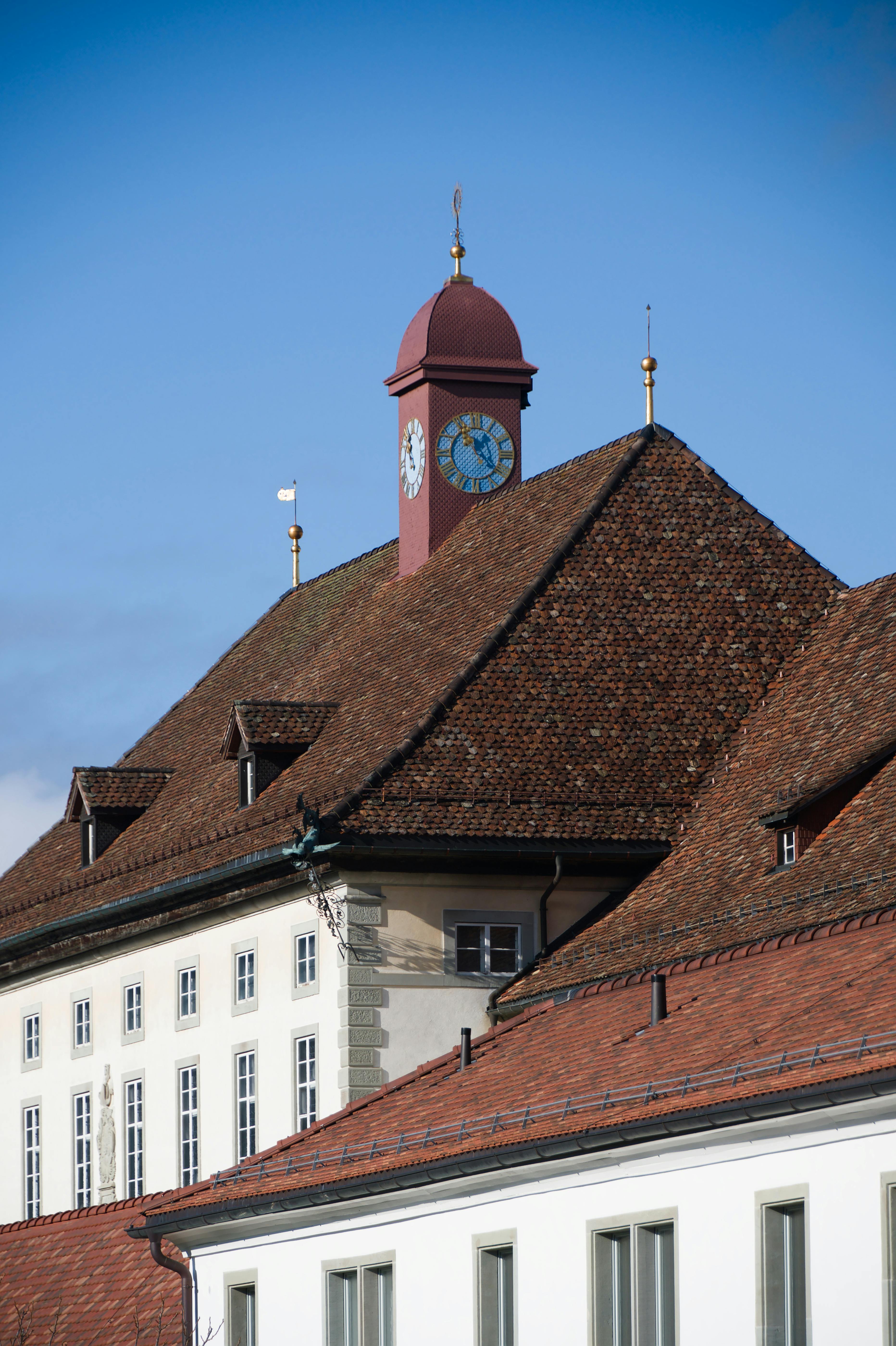 Historic European Building with Clock Tower · Free Stock Photo