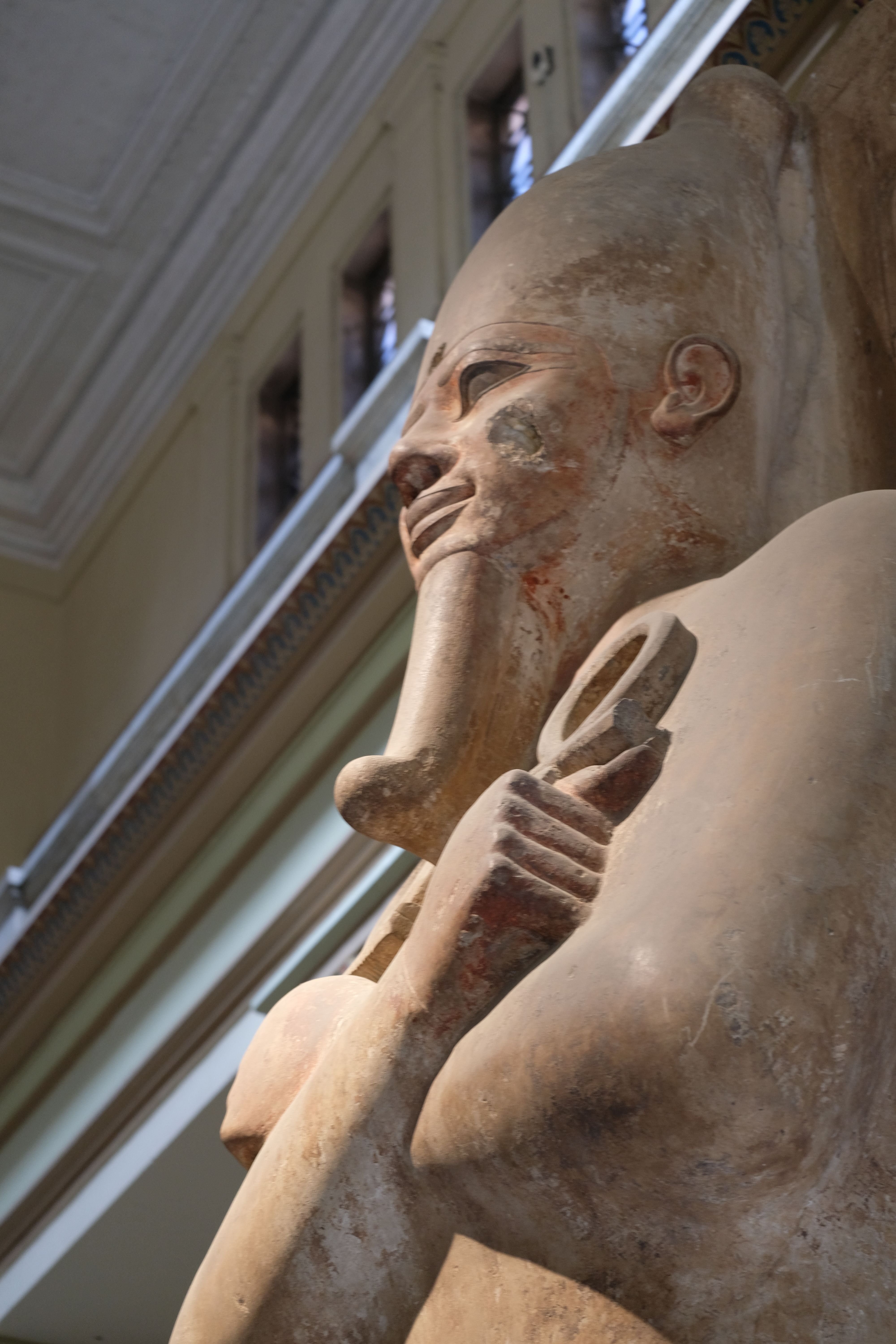 Ancient Egyptian Statue in Museum Setting · Free Stock Photo