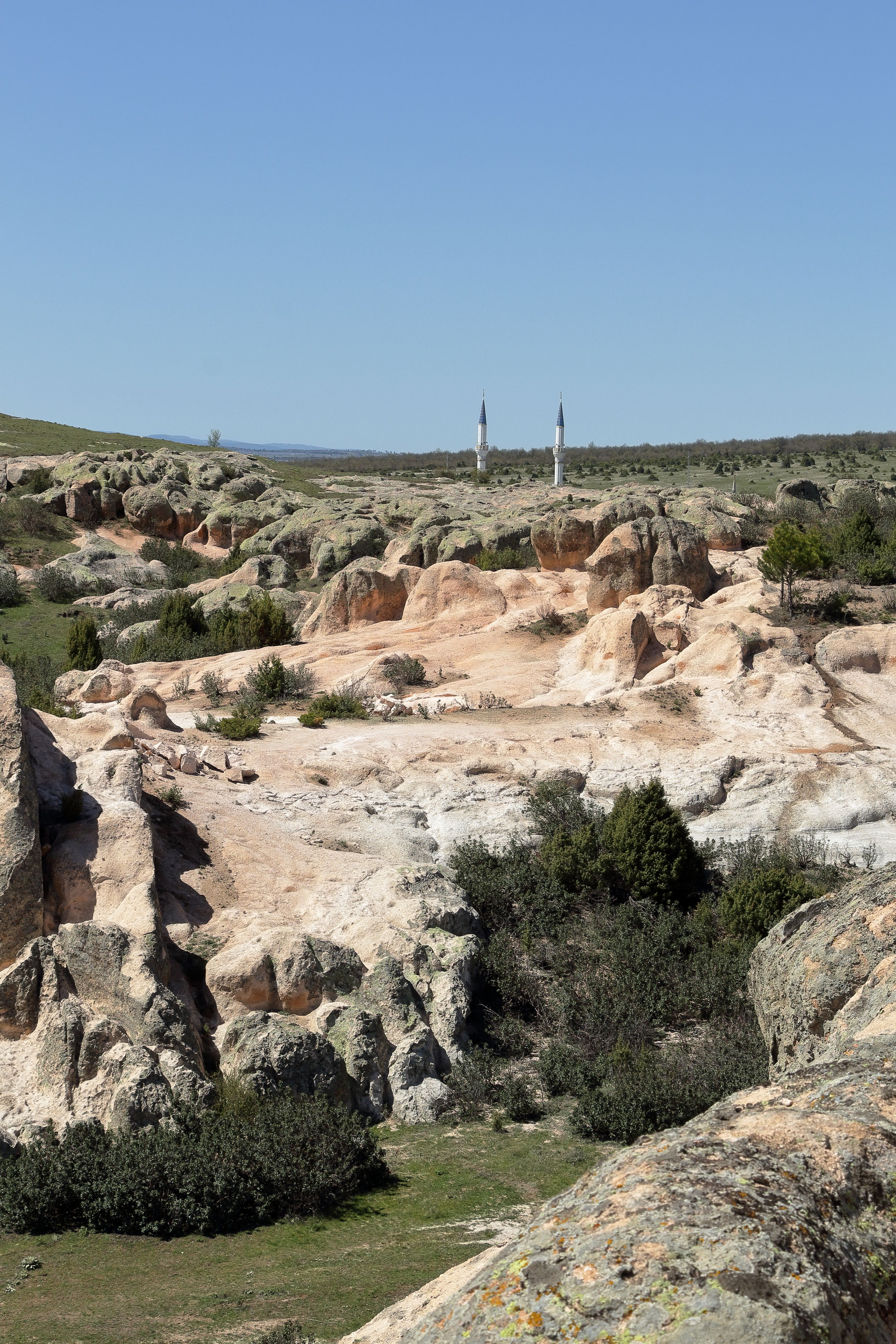 Scenic Rocky Landscape with Distant Minarets · Free Stock Photo