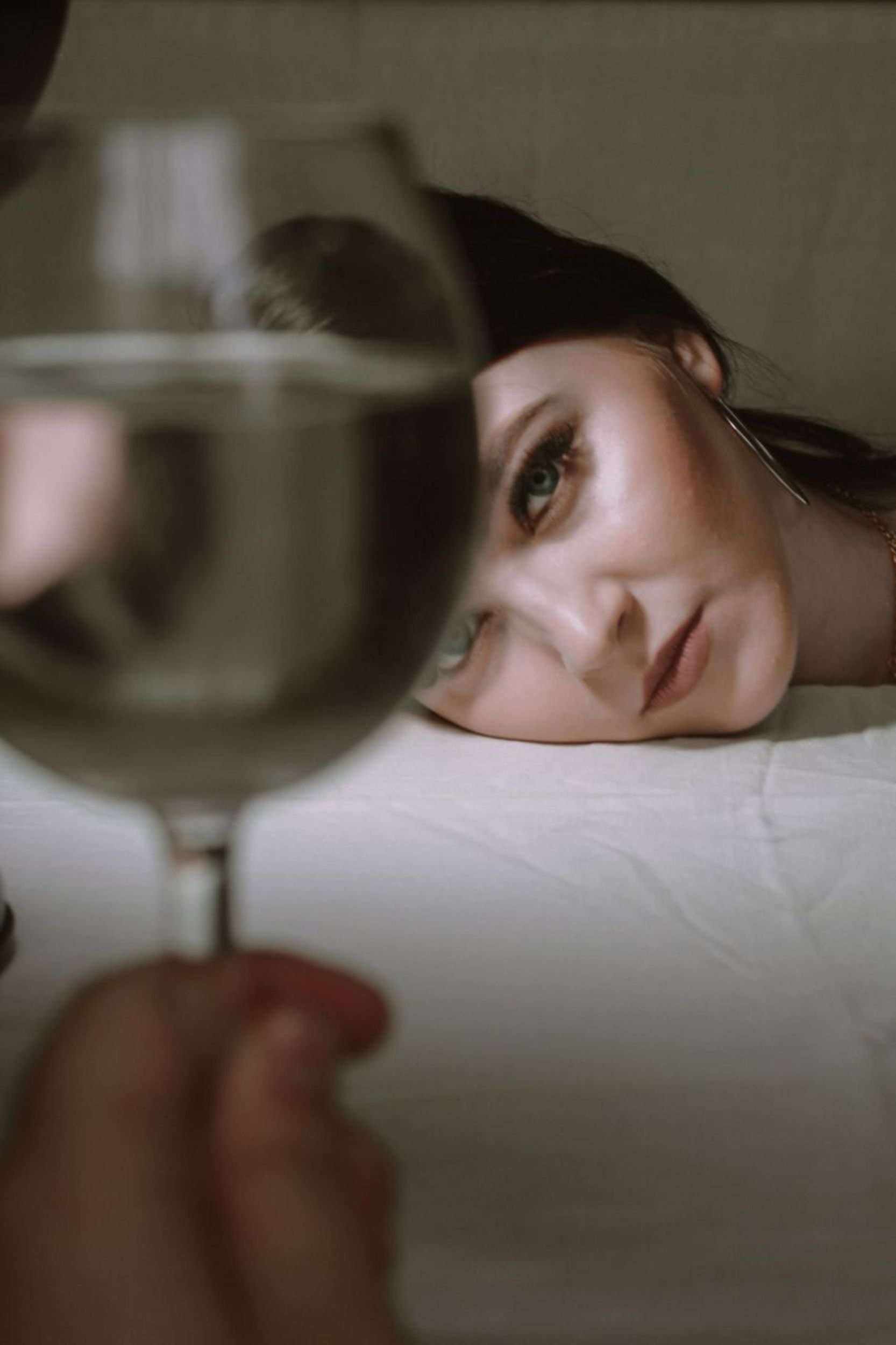 Woman Gazing Through Wine Glass, Artistic Portrait · Free Stock Photo