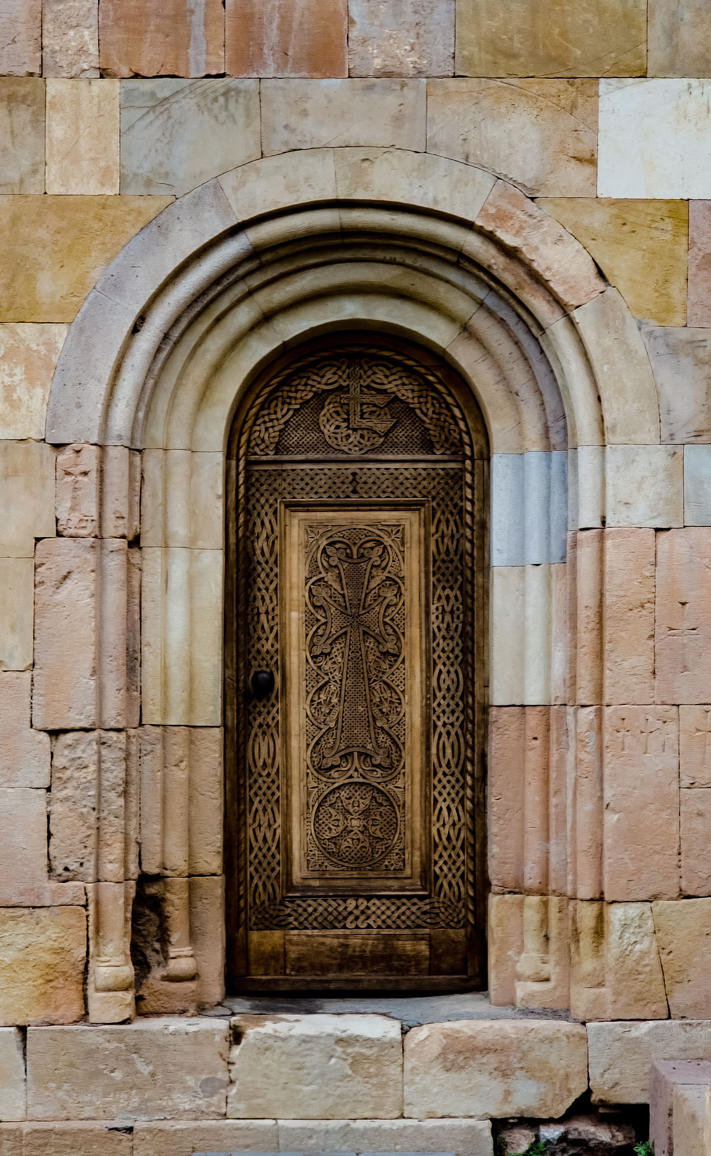 Intricately Carved Ancient Stone Doorway · Free Stock Photo