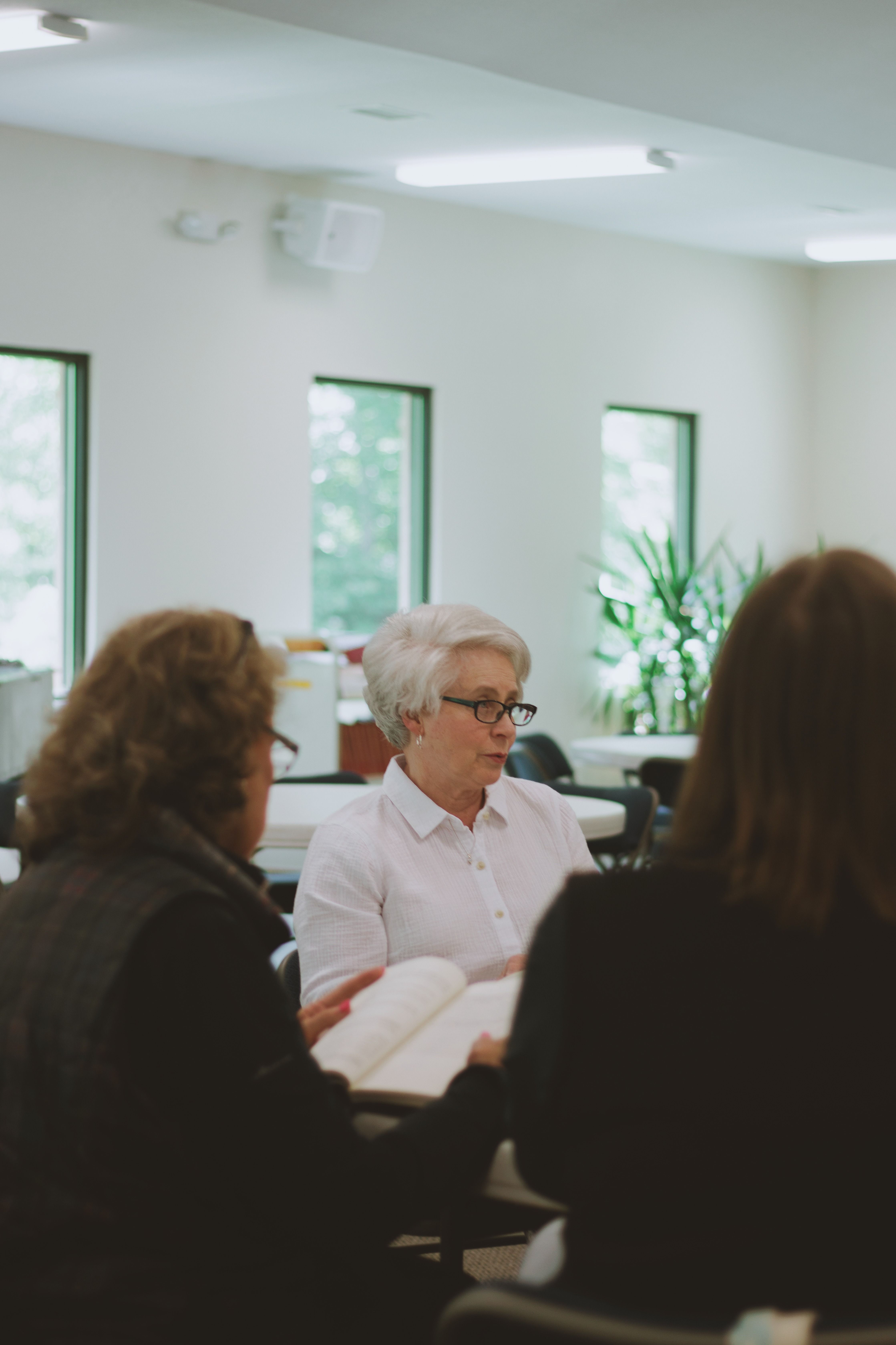 Engaging Women's Bible Study Group in Church Setting · Free Stock Photo