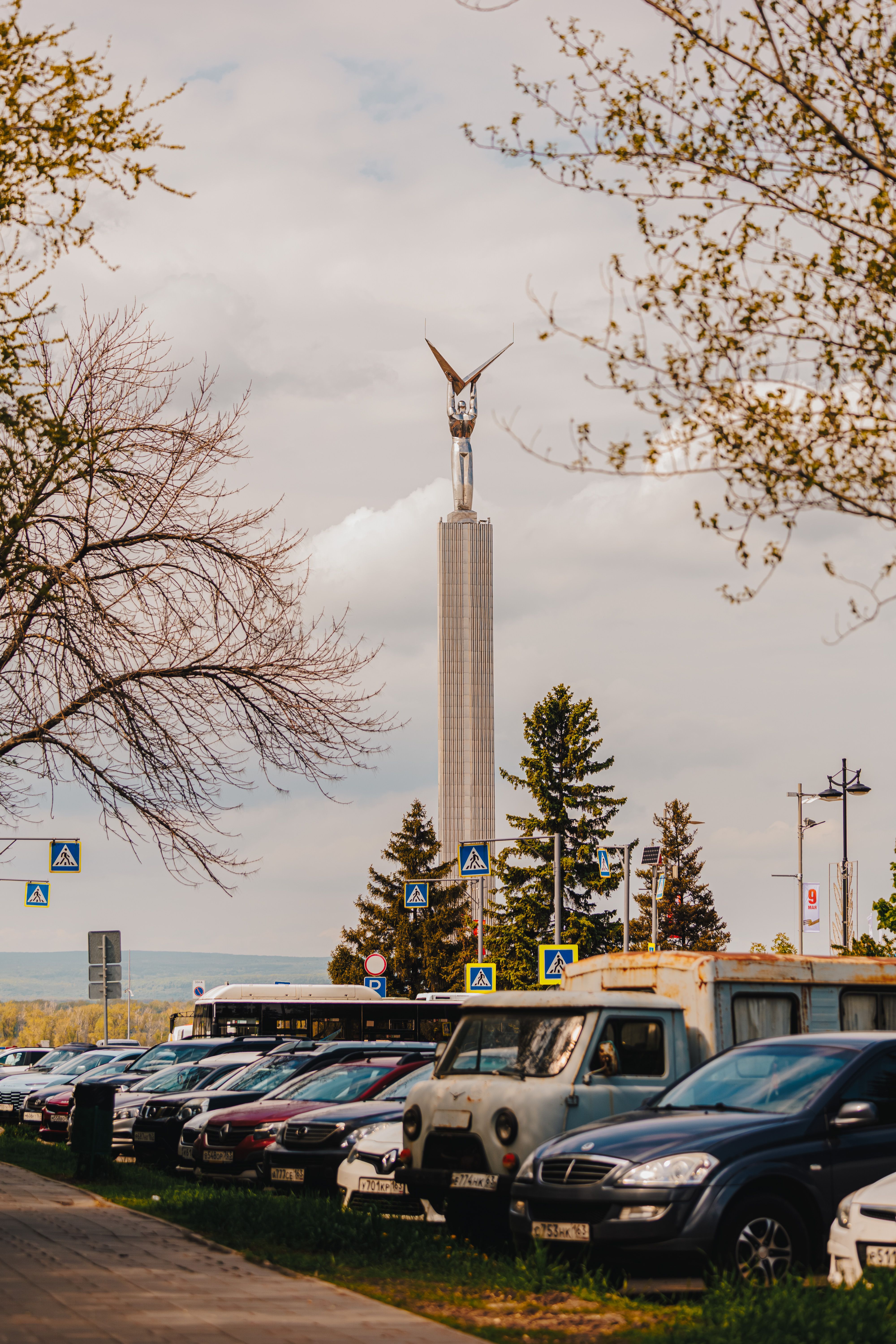 Cars Parked with Monument View in Spring · Free Stock Photo
