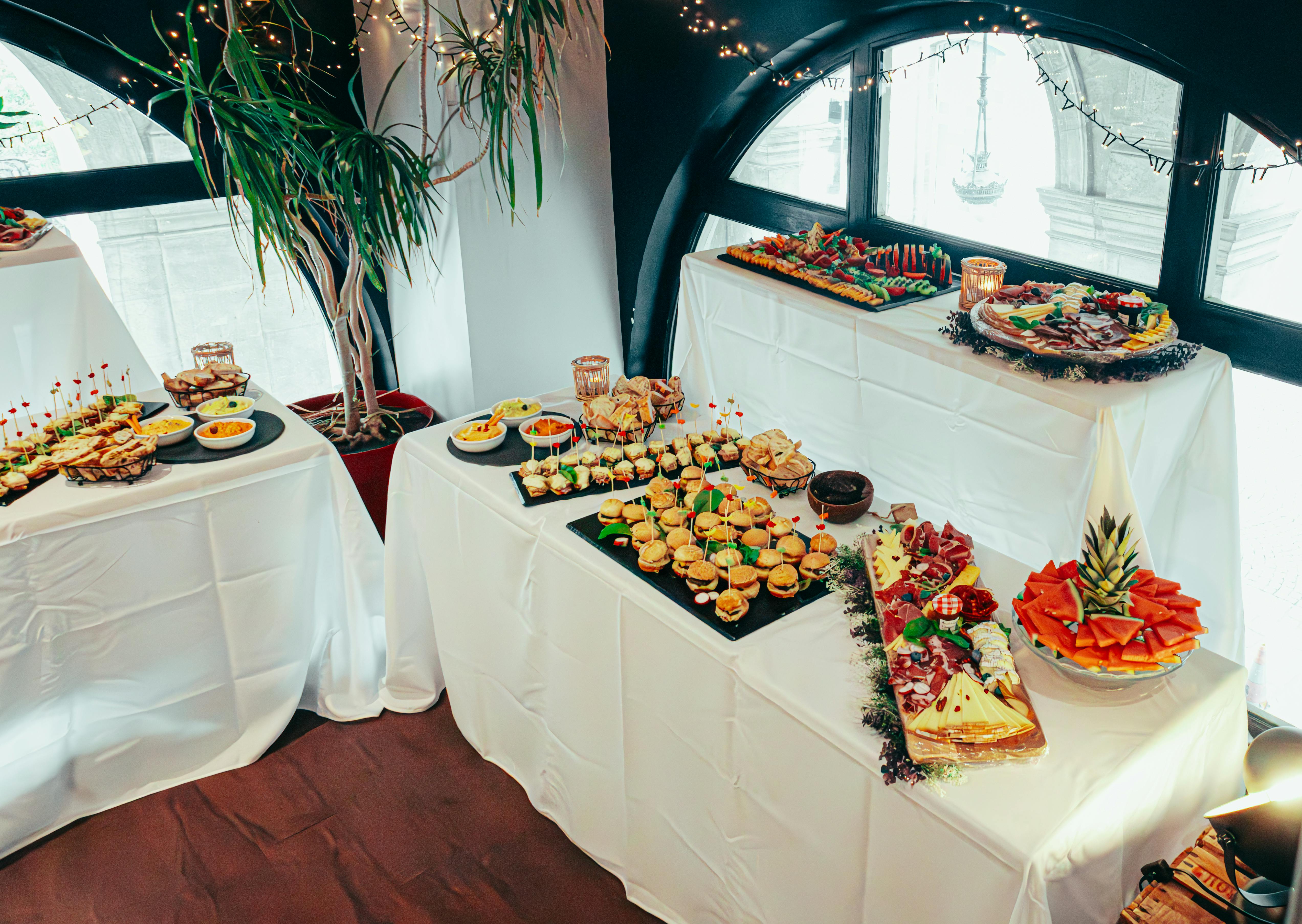 Elegant Indoor Buffet Table with Assorted Appetizers · Free Stock Photo