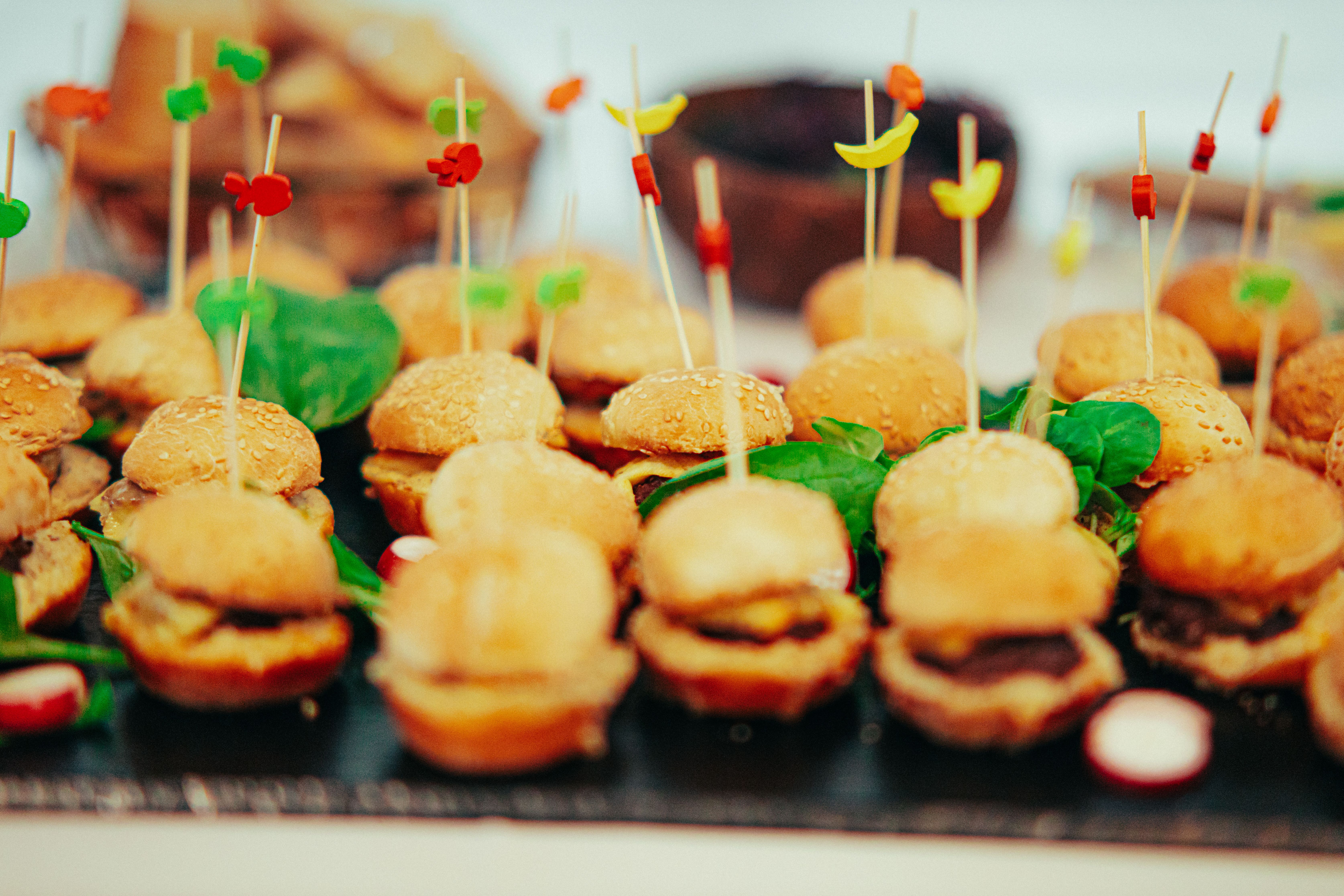 Assorted Mini Burgers on Display at Event · Free Stock Photo