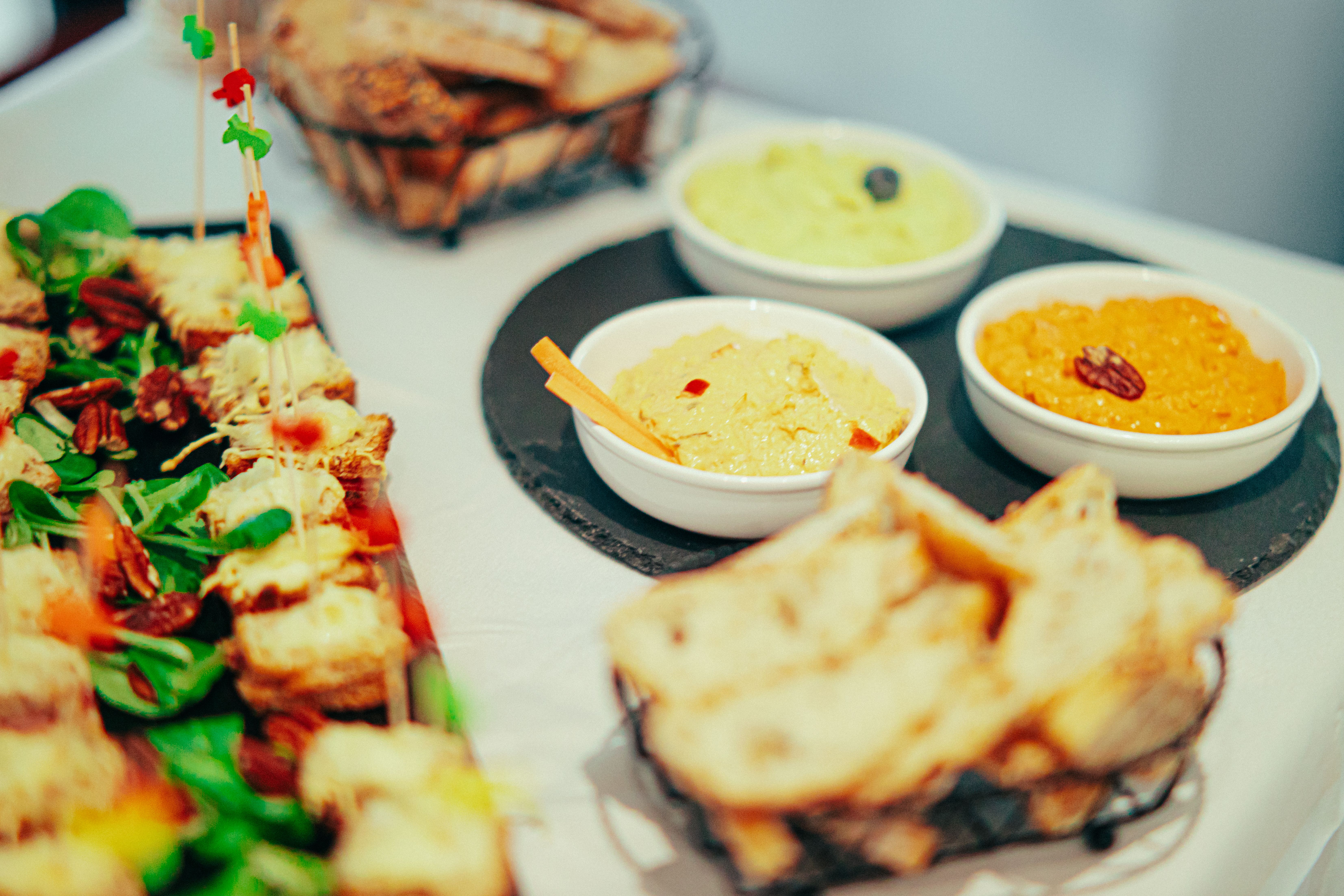 Gourmet Dips and Appetizers on Elegant Display · Free Stock Photo