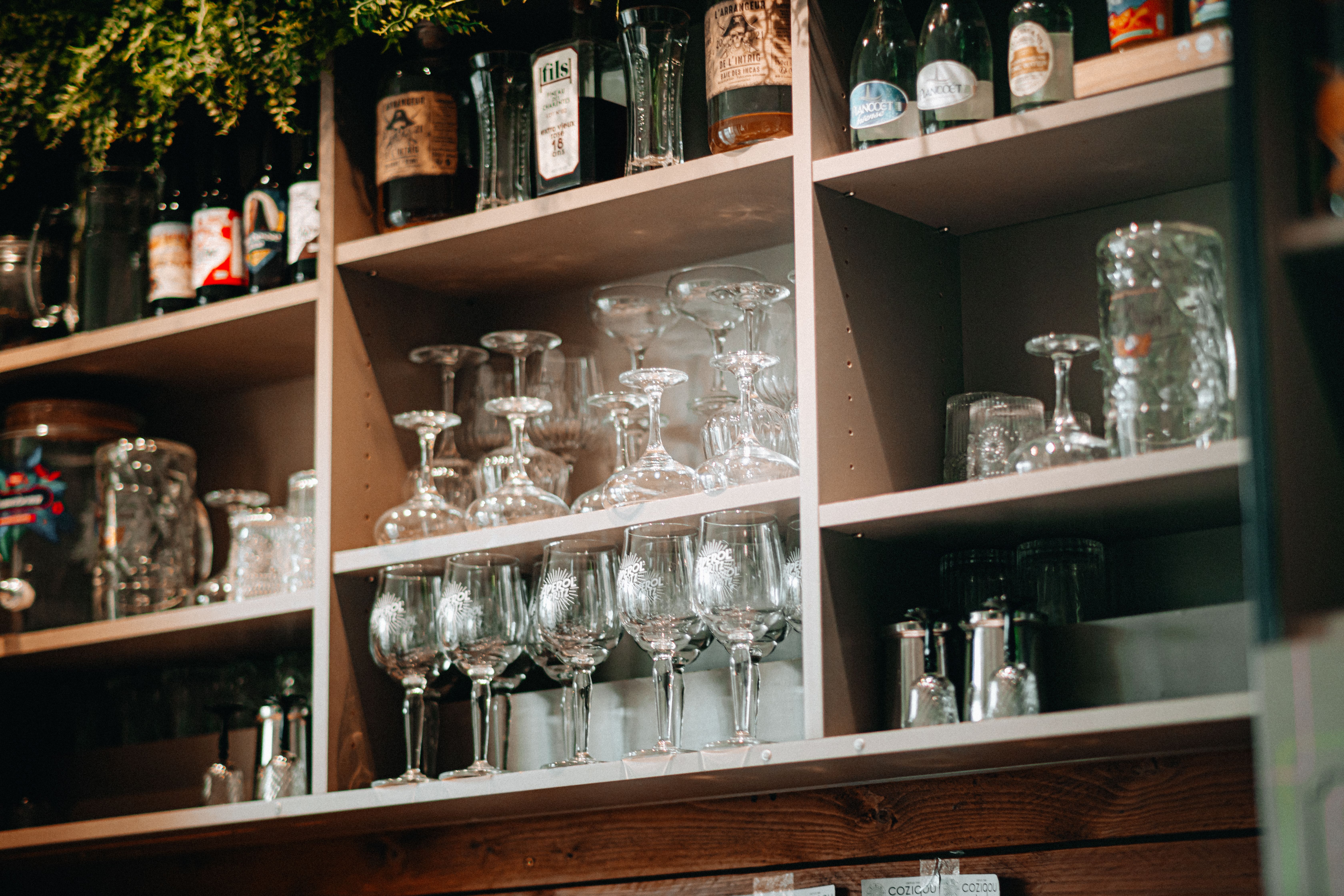 Variety of Glassware on Display in a Bar Setting · Free Stock Photo