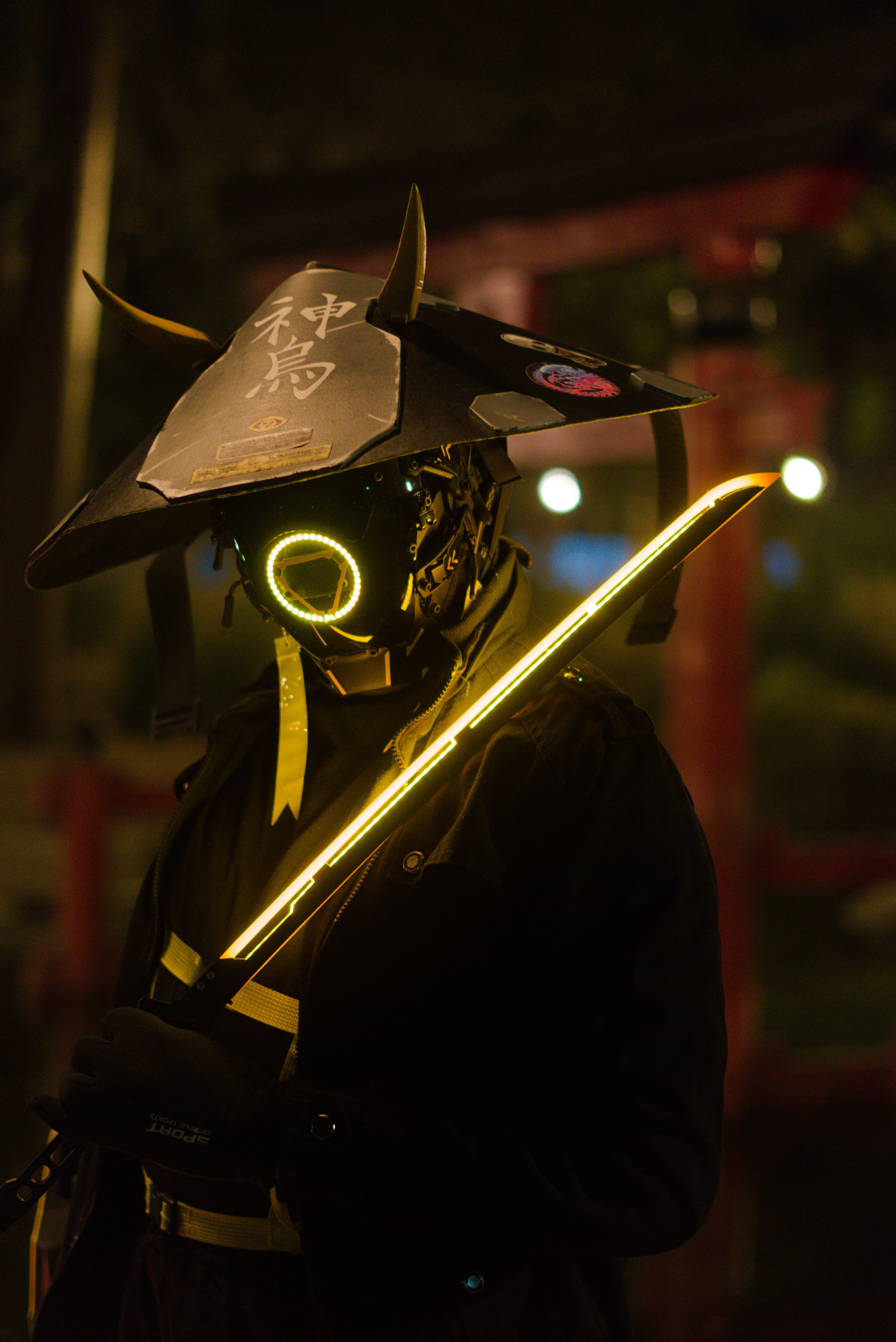Cyberpunk Samurai with Neon Sword at Night · Free Stock Photo