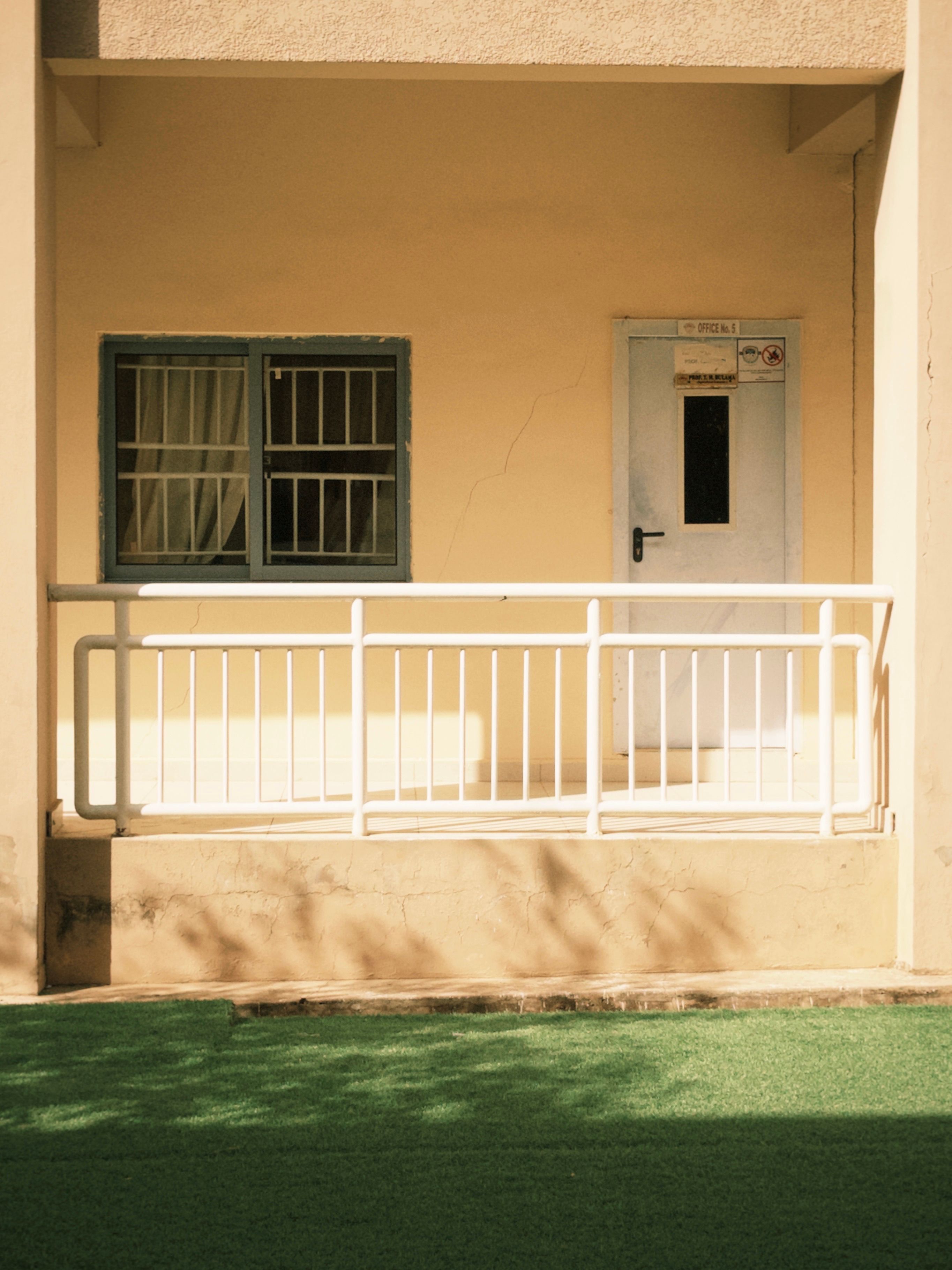 Sunny Outdoor Porch with Door and Window · Free Stock Photo