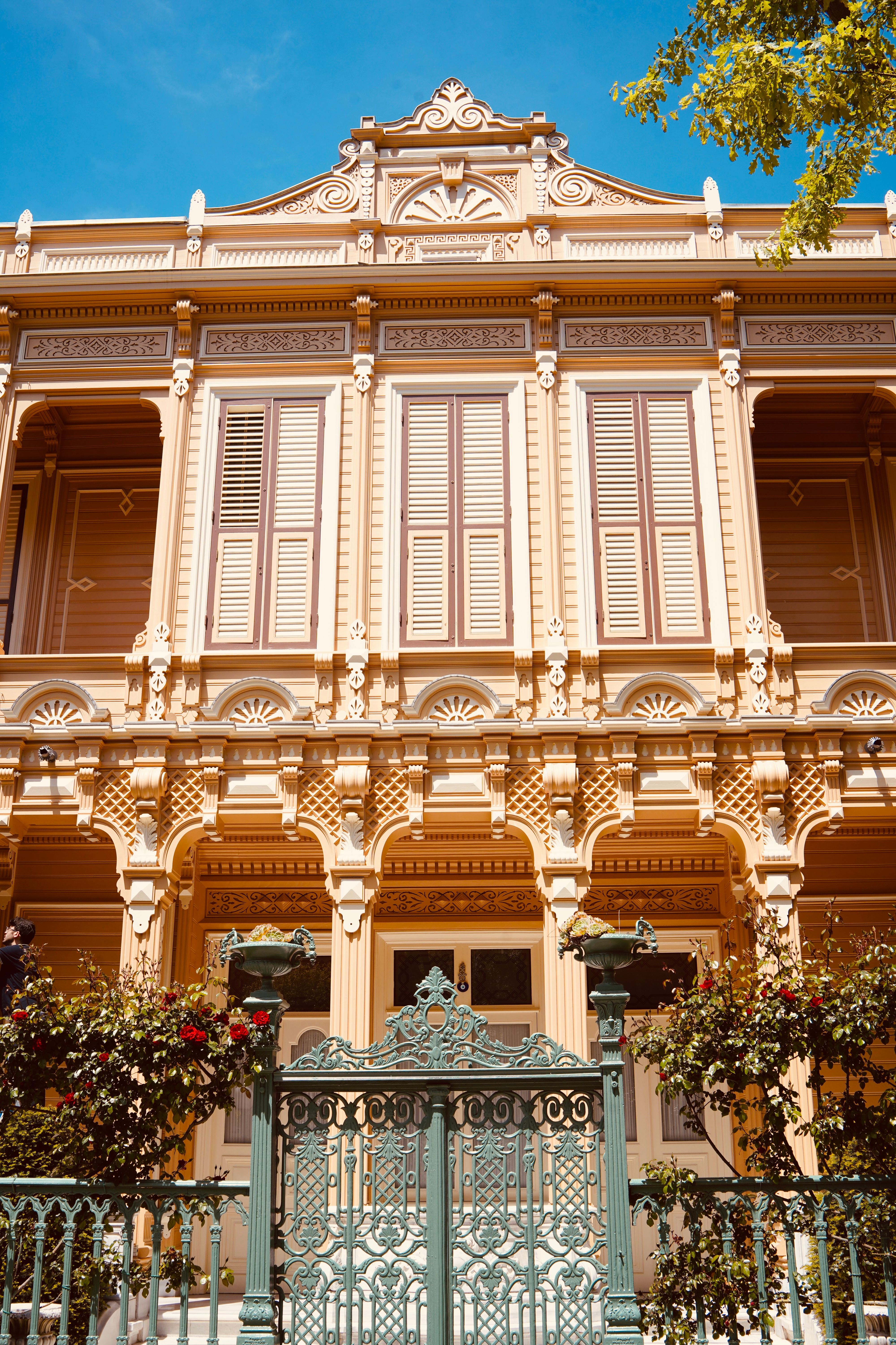 Elegant Victorian House with Ornate Details · Free Stock Photo