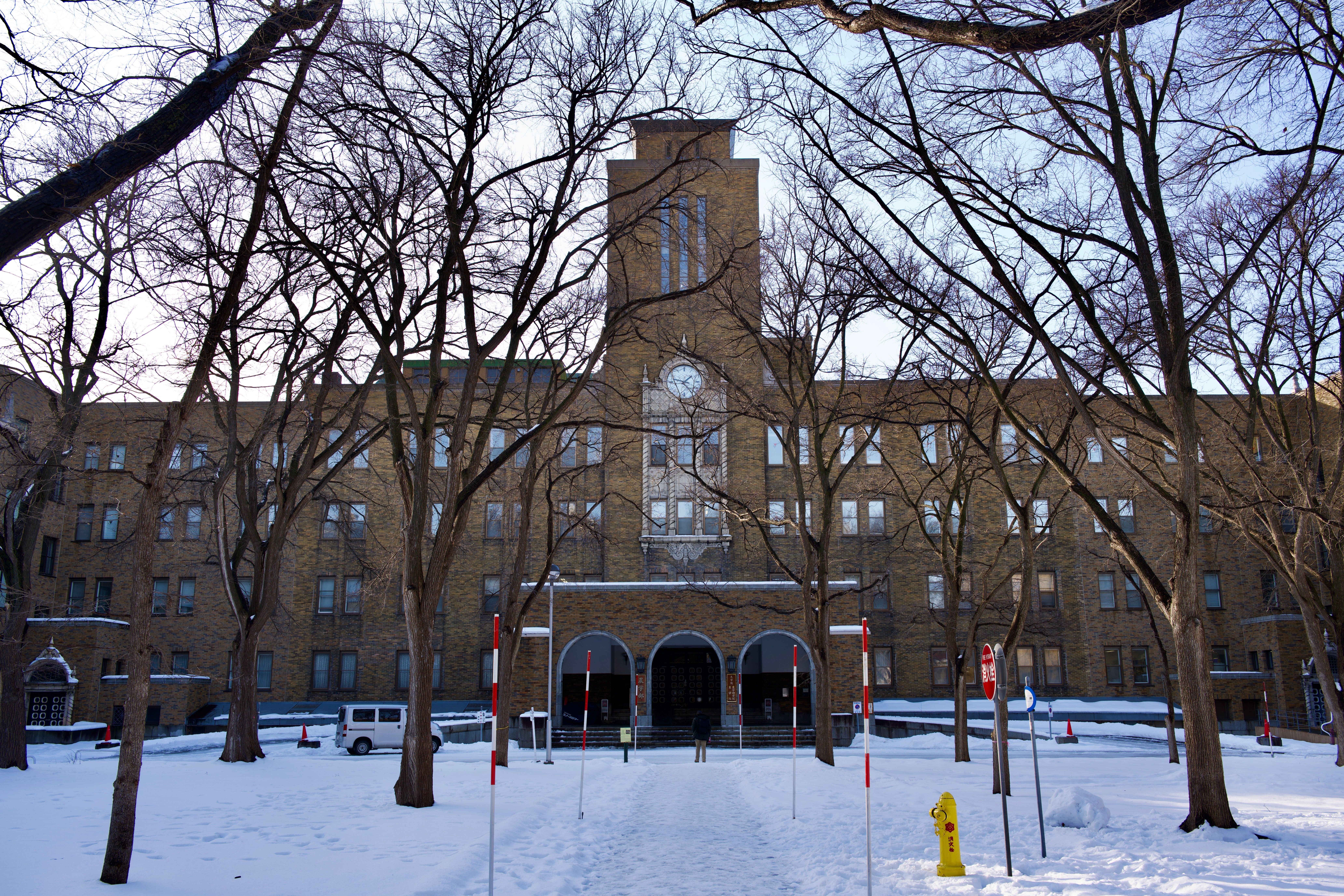 Historic Brick Building in Snowy Winter Scene · Free Stock Photo