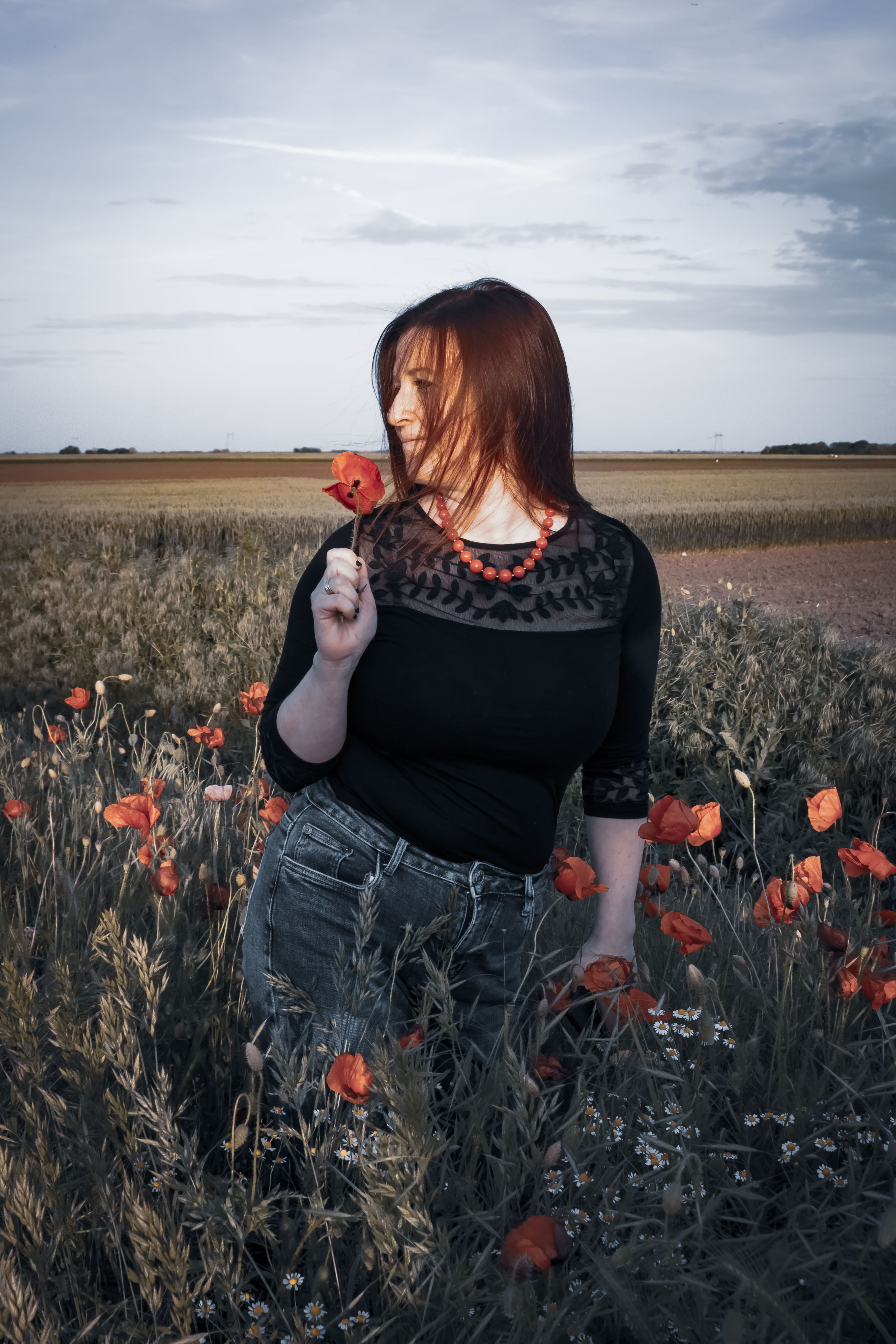 Woman in Black Top Enjoying Poppy Field · Free Stock Photo