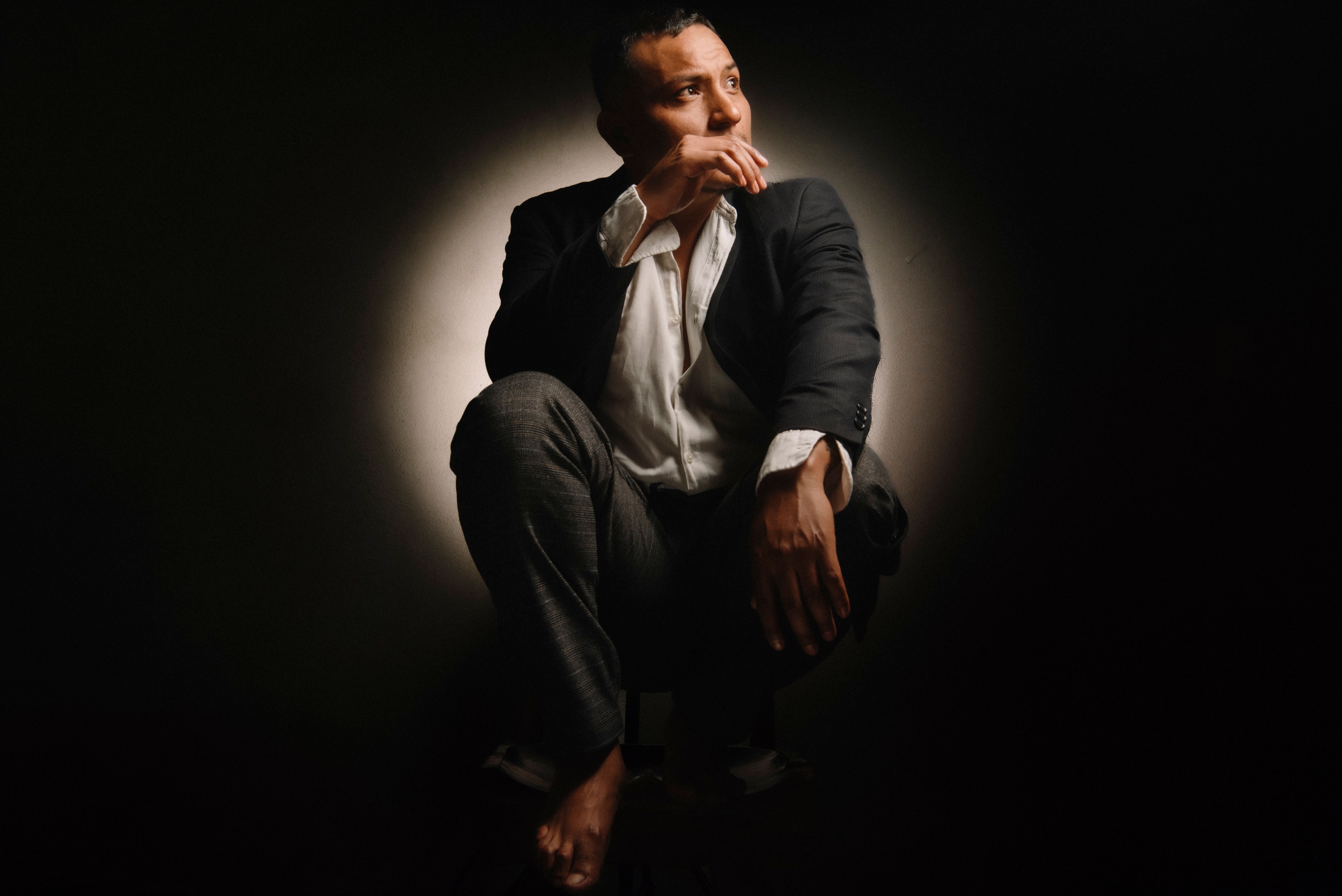 Thoughtful Man in Dramatic Lighting Portrait · Free Stock Photo