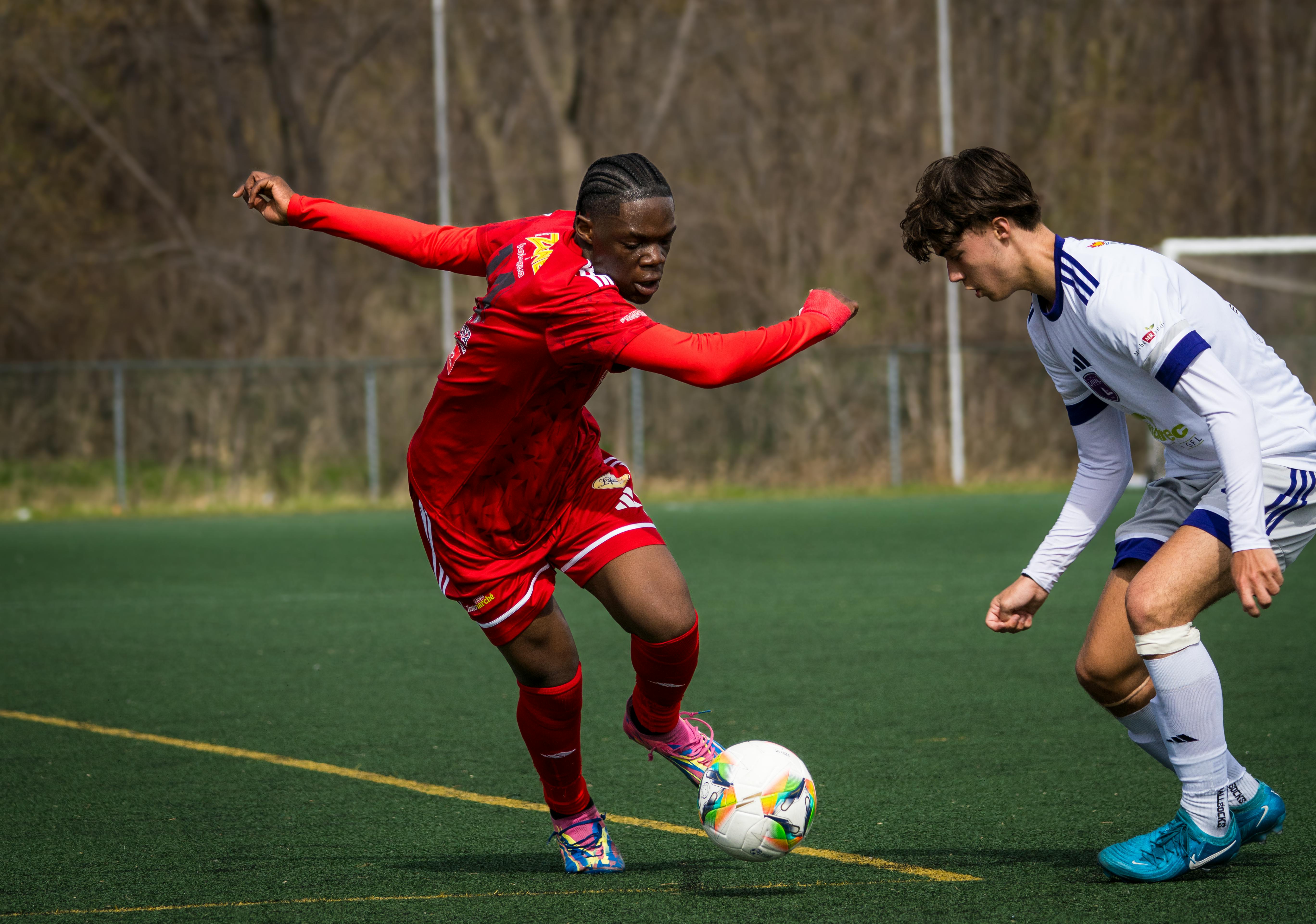 Intense Soccer Match Action in Montreal · Free Stock Photo