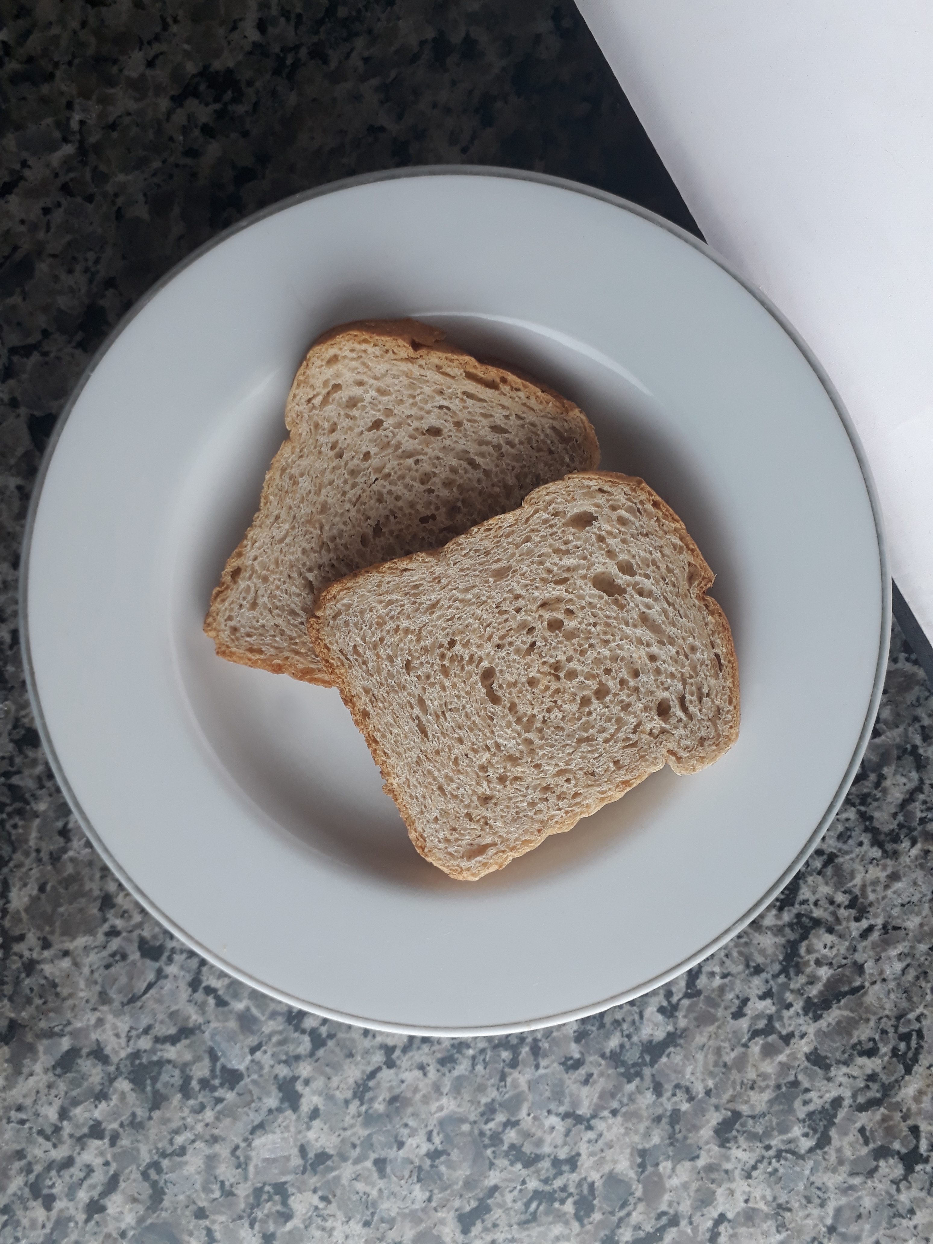 Slice of Loaf Bread With Dog Face · Free Stock Photo