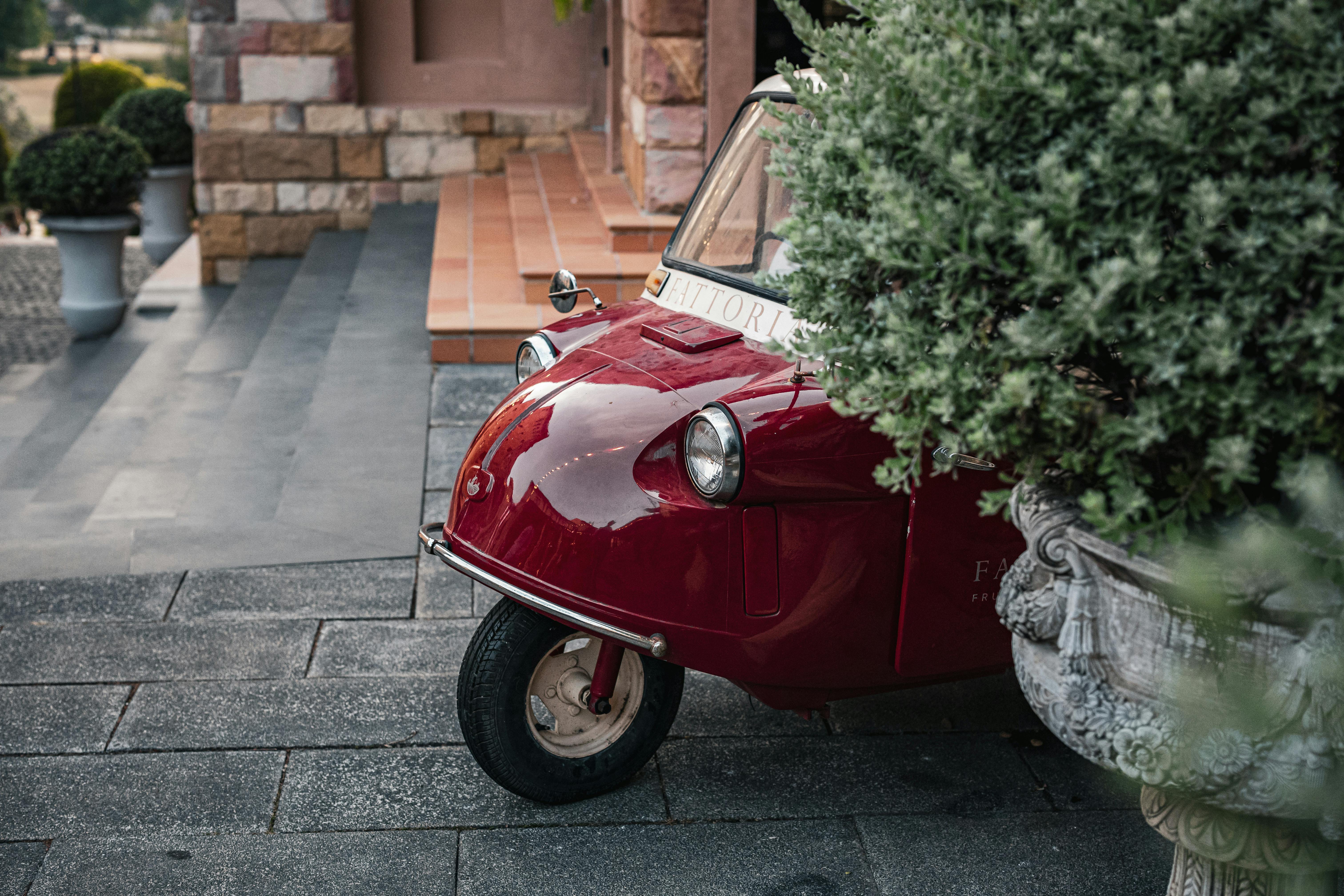 Vintage Microcar Near Stone Terrace in Thailand · Free Stock Photo