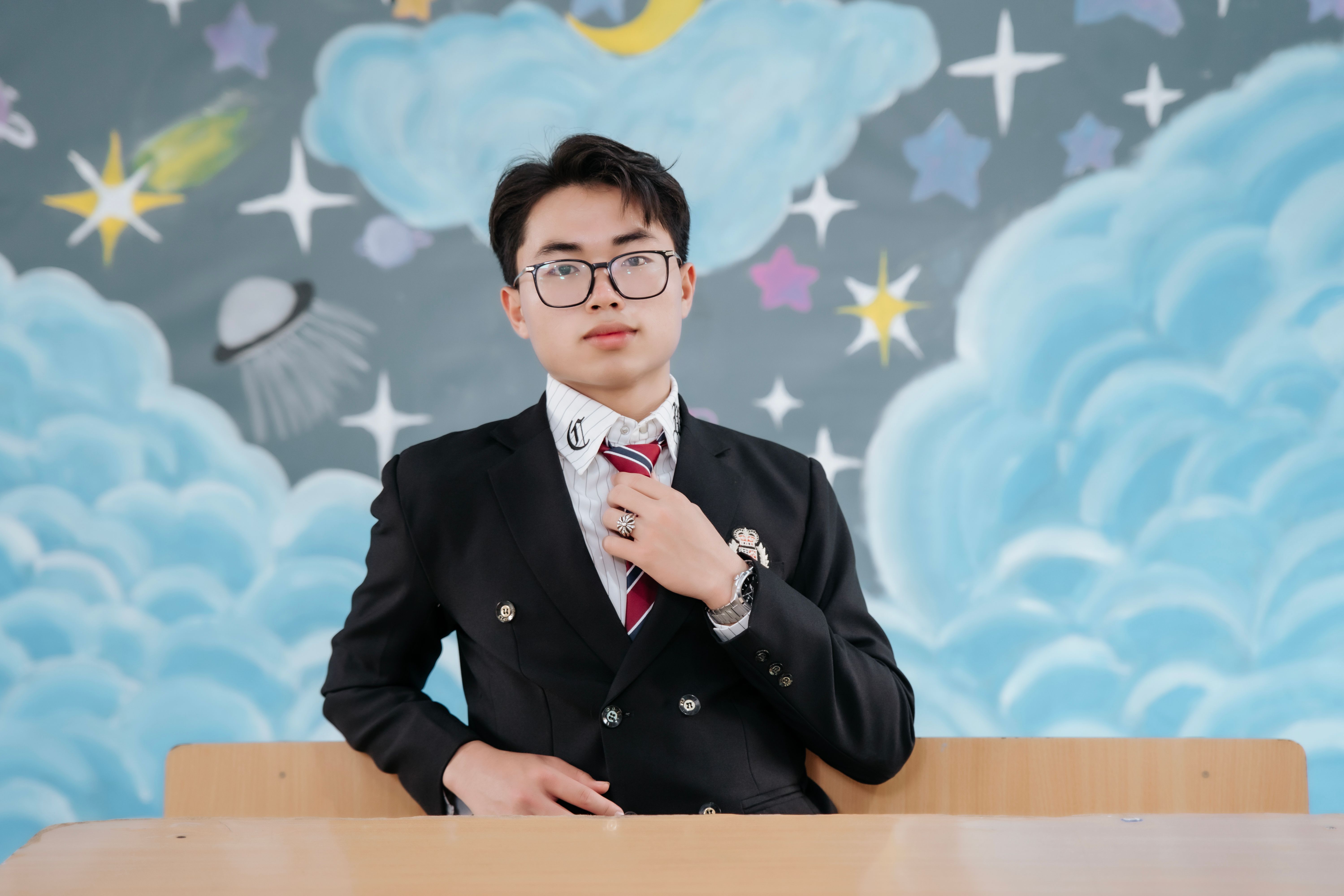 Young Professional with Creative Background · Free Stock Photo