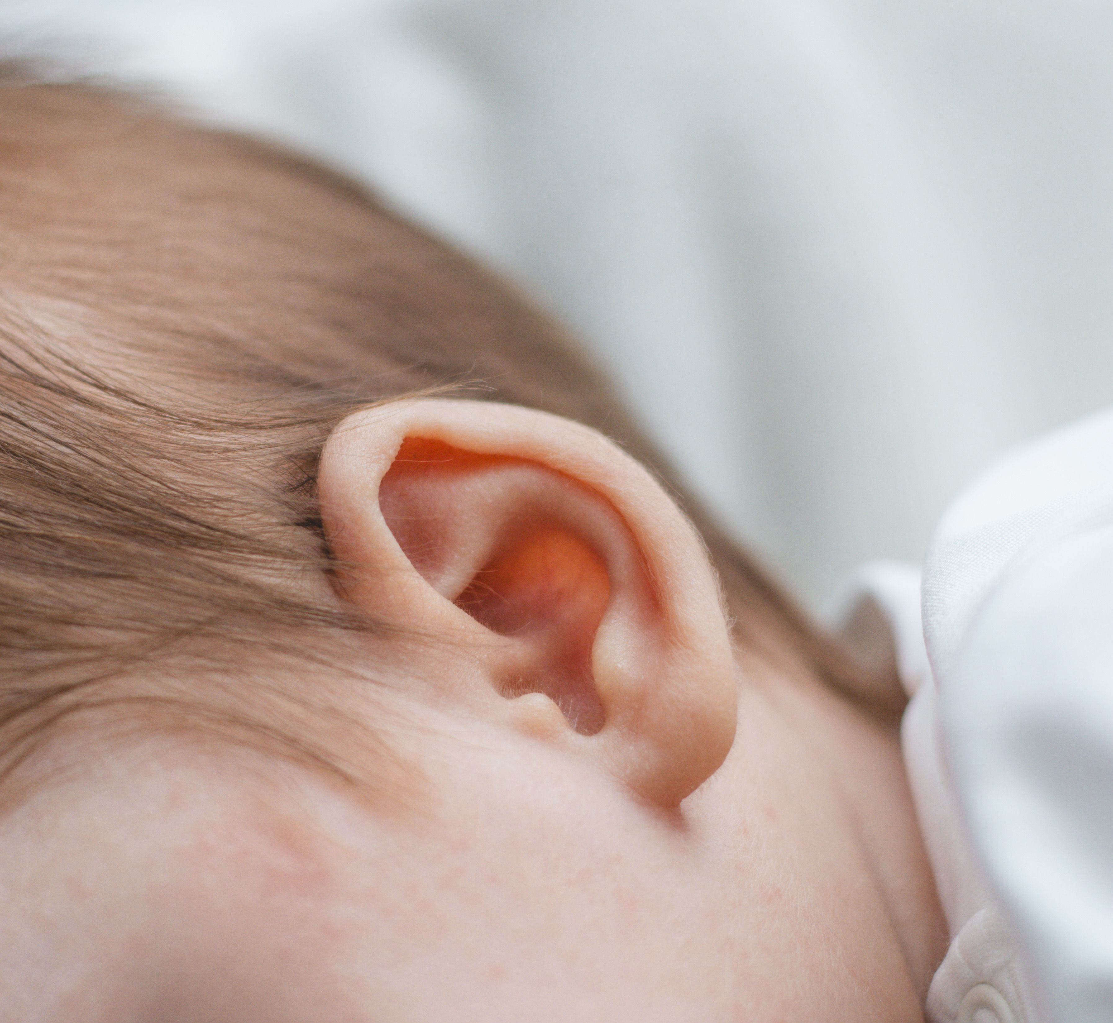 Primer Plano De La Oreja De Un Bebé Recién Nacido · Foto de stock gratuita