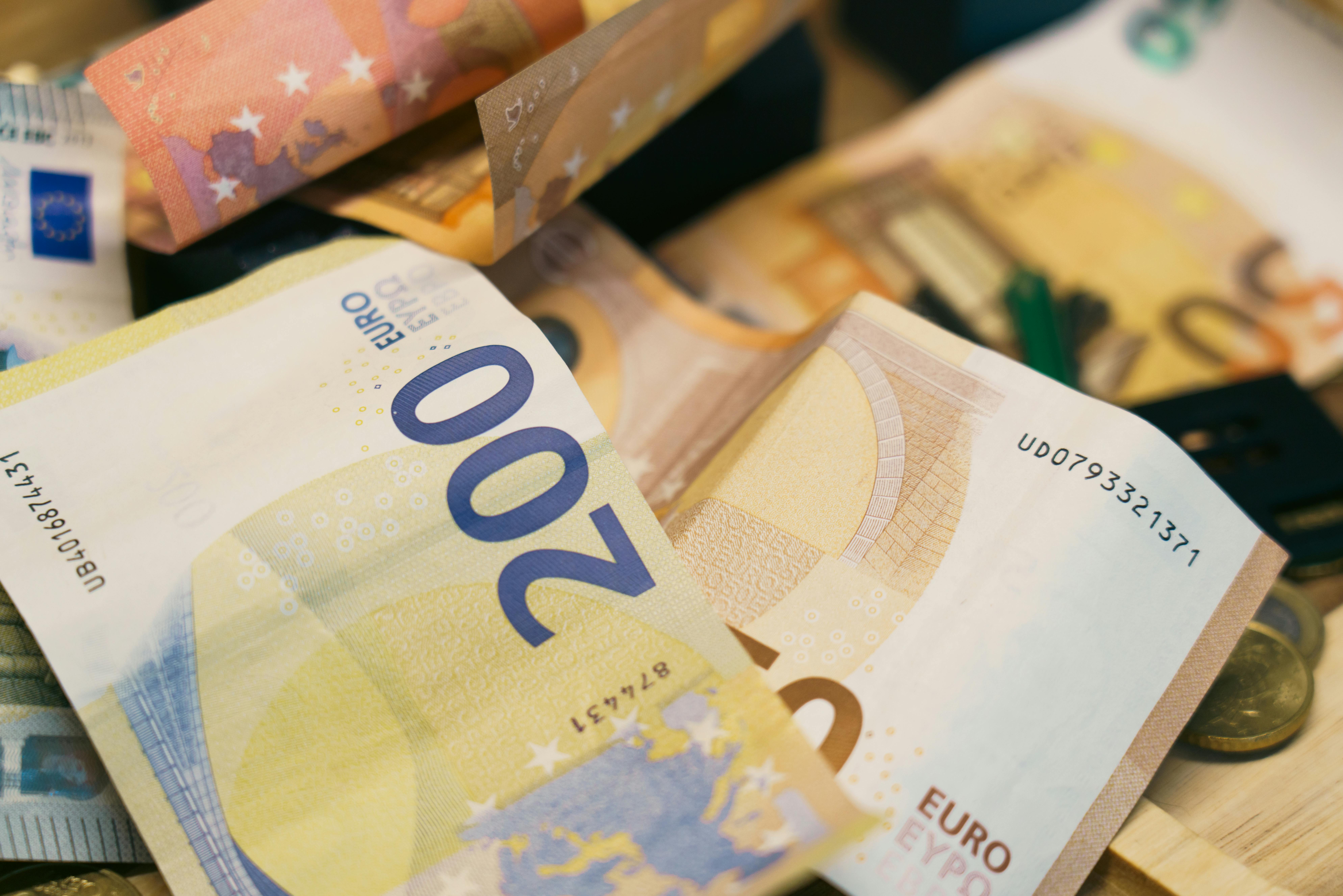 Euro Banknotes in a Pile Indicating Wealth and Finance · Free Stock Photo