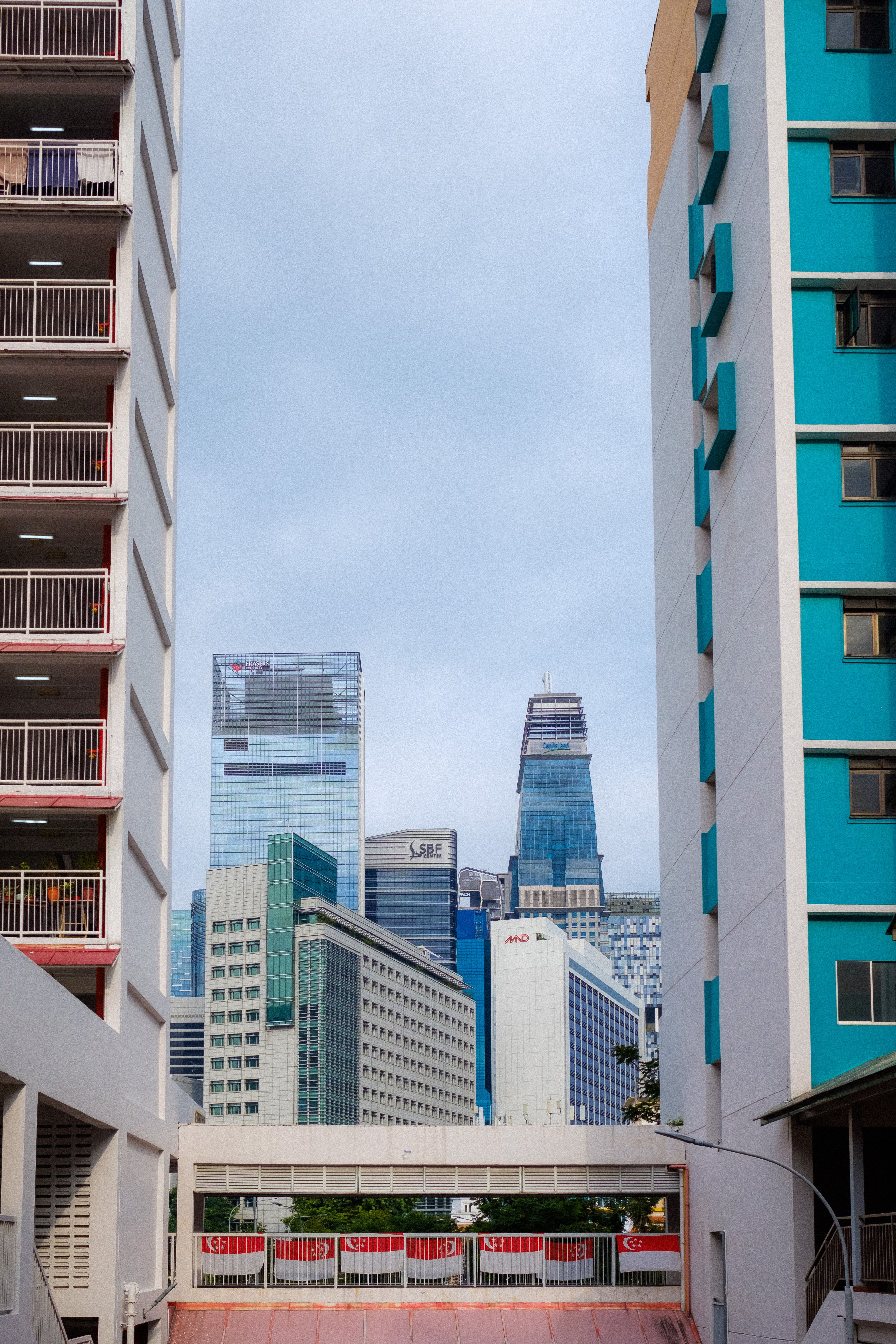 Modern City Skyline Between Urban Buildings · Free Stock Photo