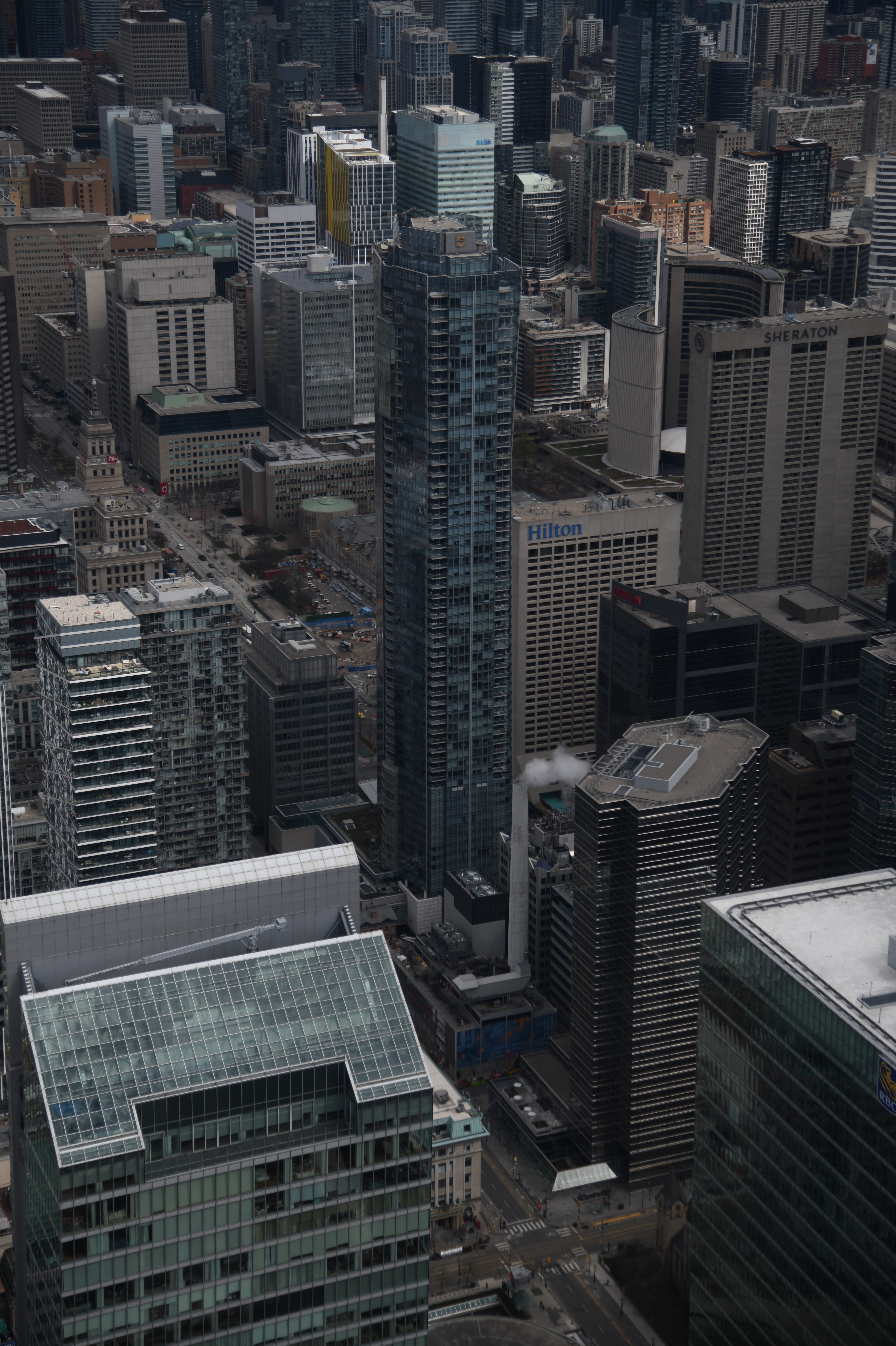 Photo of High-Rise Building Under Cloudy Sky · Free Stock Photo