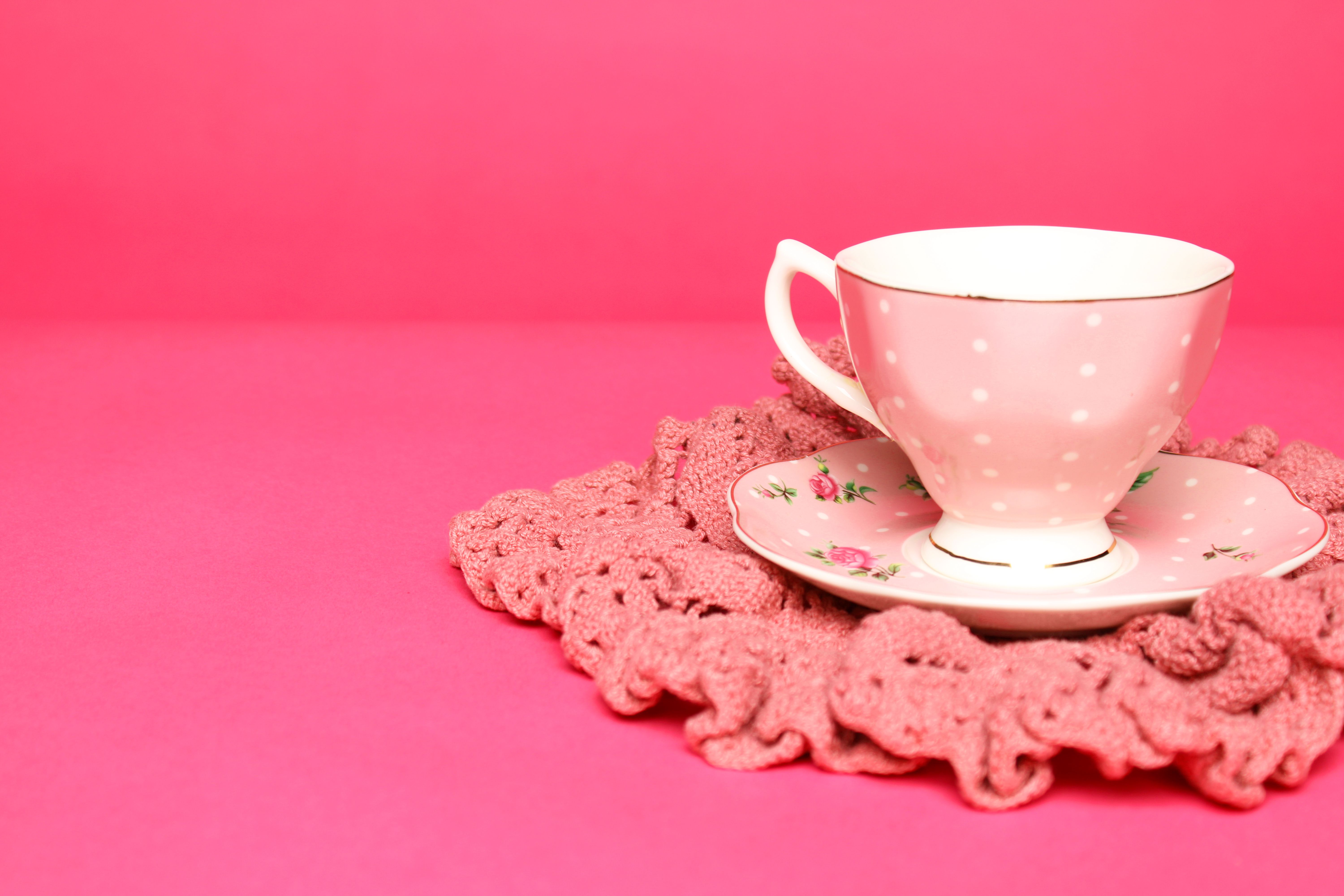 Elegant Pink Teacup on Textured Pink Background · Free Stock Photo