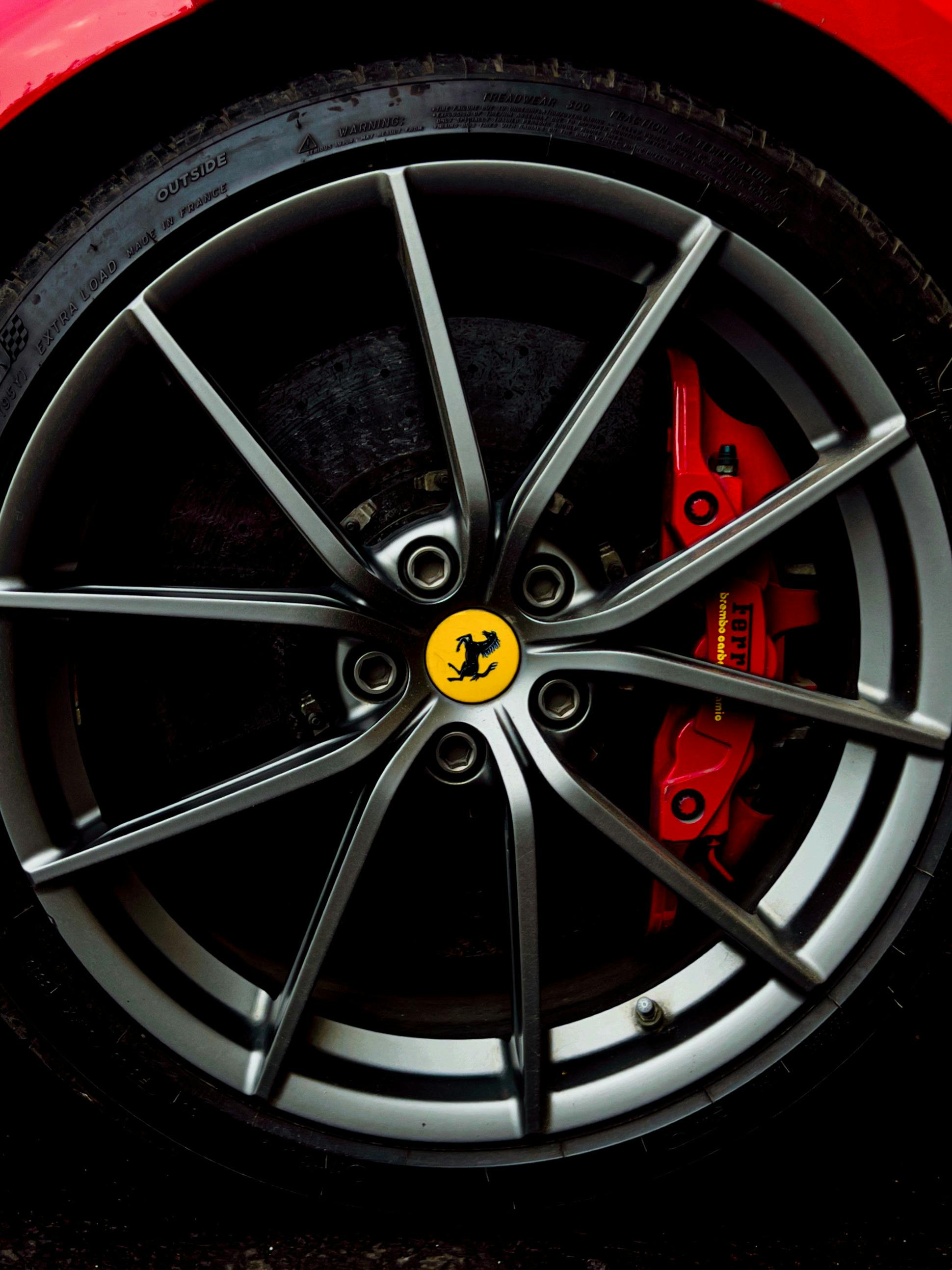 Close-Up Photo of Ferrari Rim · Free Stock Photo