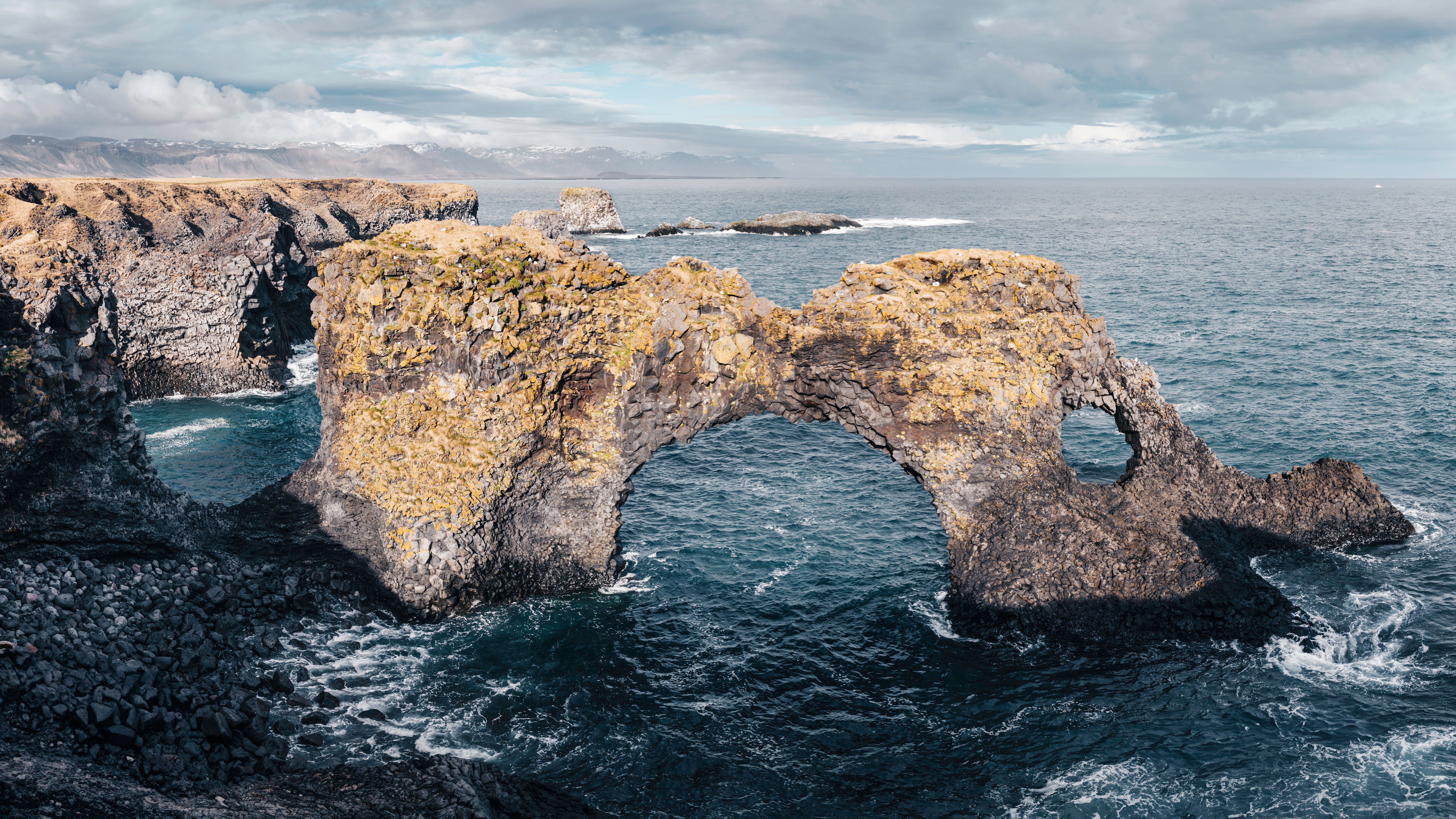 Majestic Rock Formation in Iceland's Coastline · Free Stock Photo