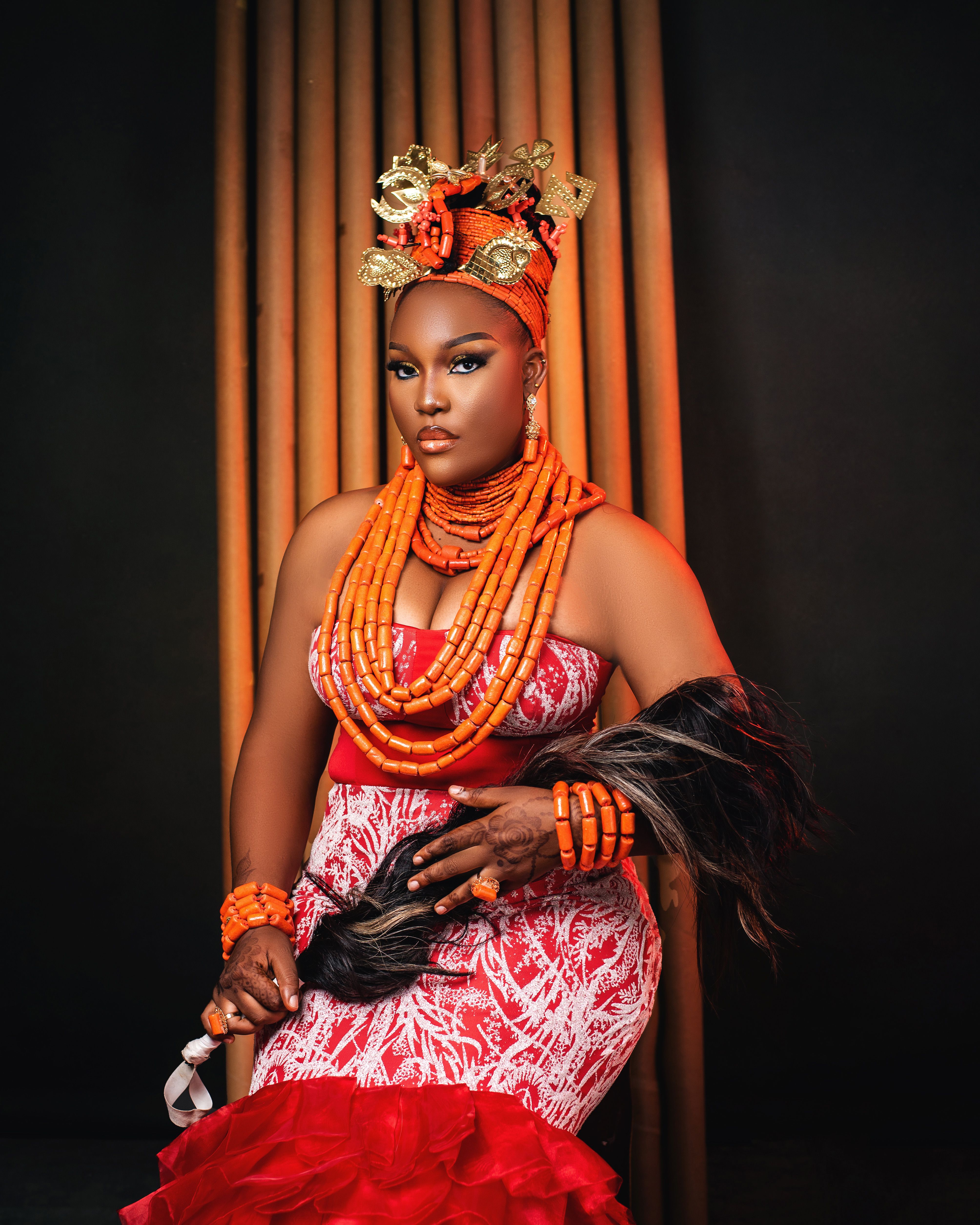 Dreamy chubby African woman in traditional wear in darkness · Free ...