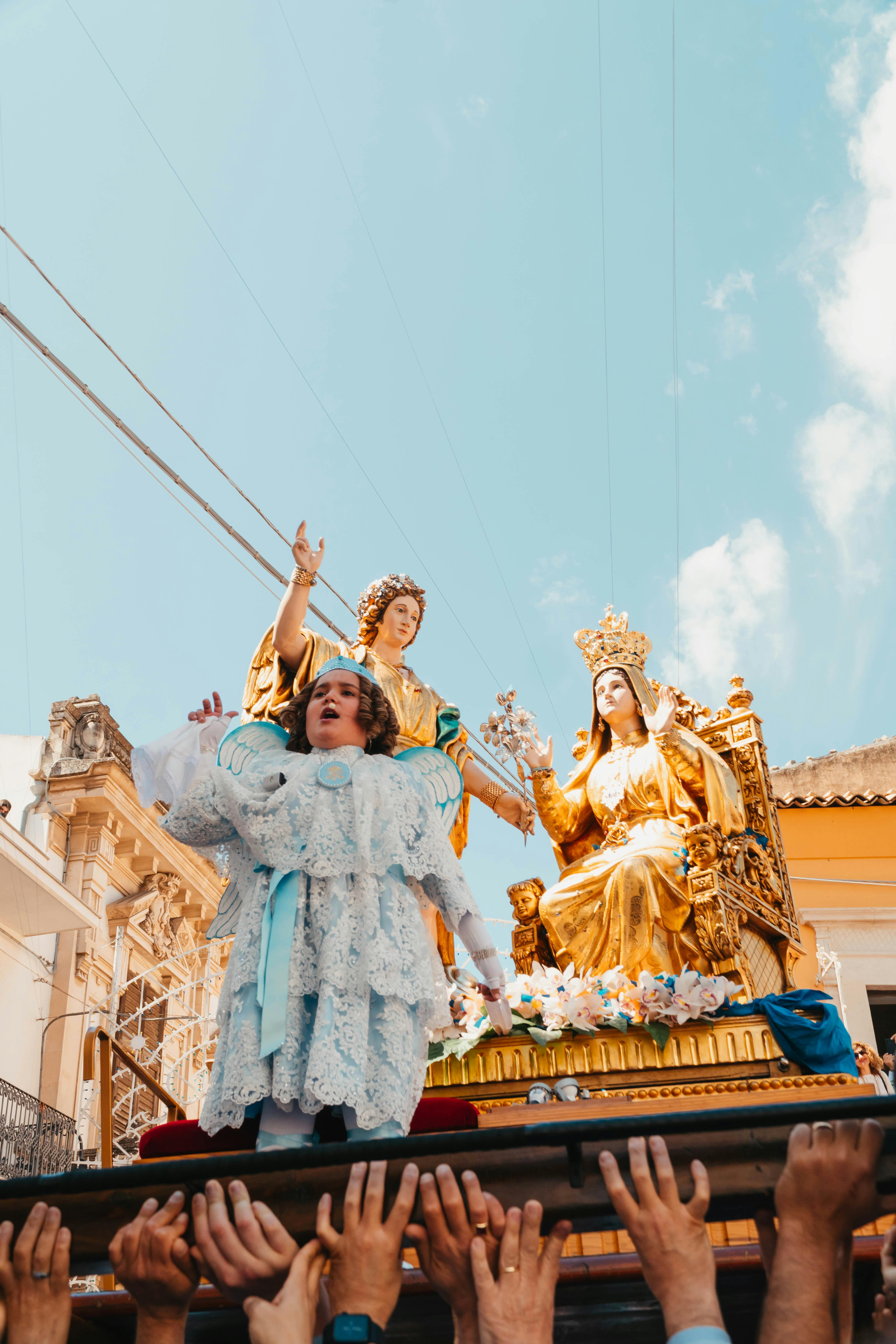 Vibrant Religious Procession with Statues · Free Stock Photo