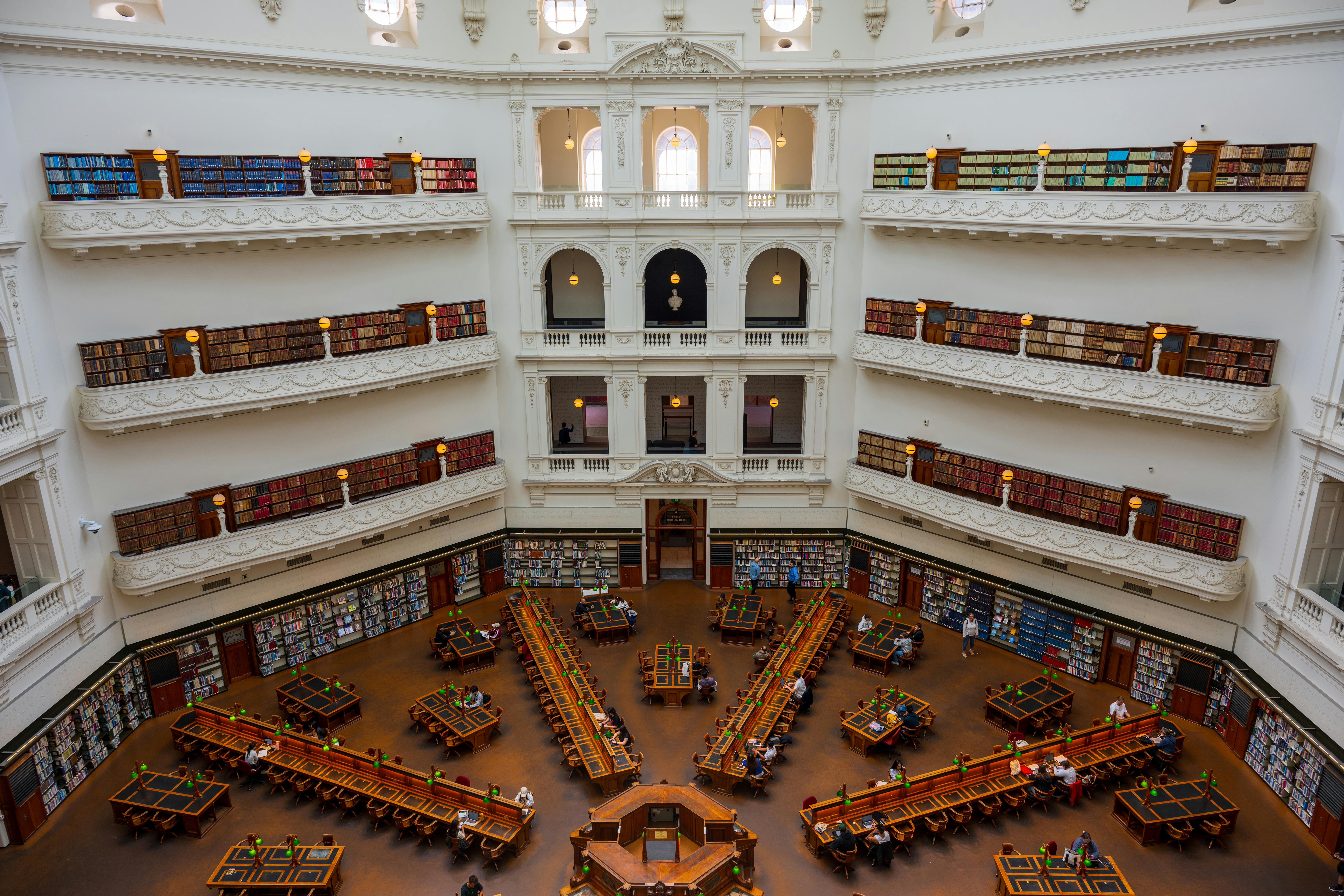 Grand Library Interior with Reading Desks · Free Stock Photo