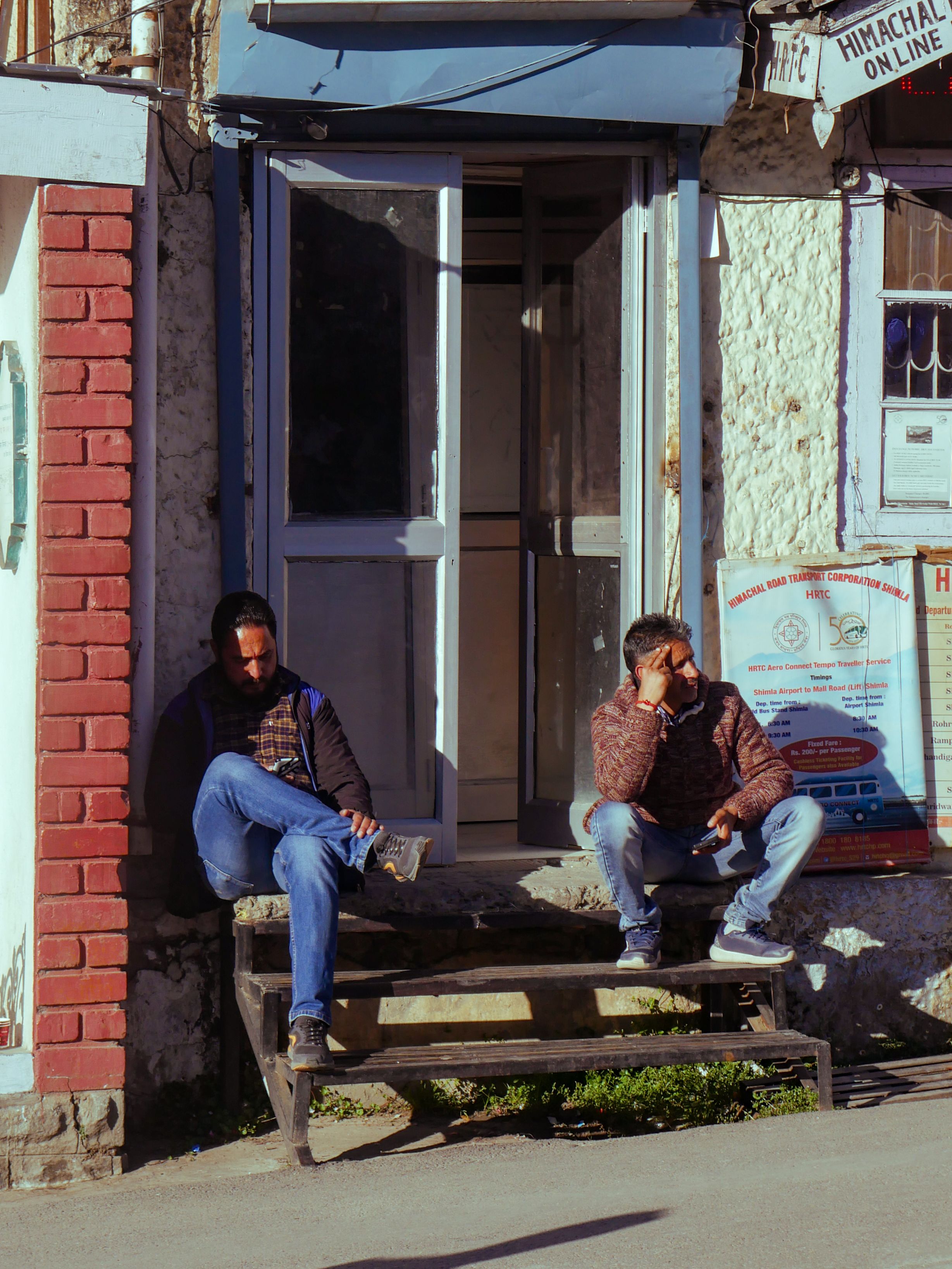 Men Sitting Outside Building in Himachal Pradesh · Free Stock Photo