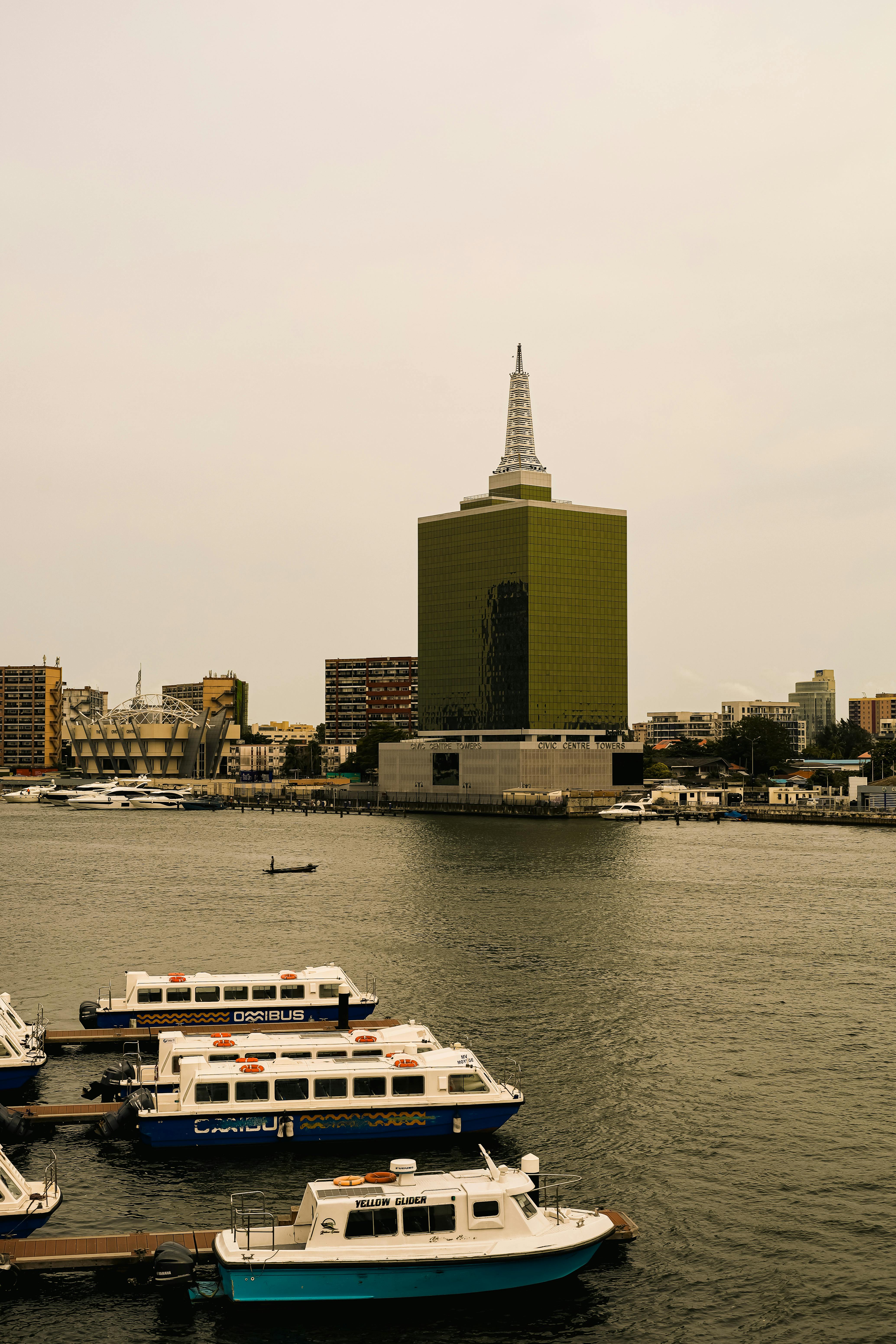 Skyline View of Lagos with Boats and Iconic Building · Free Stock Photo
