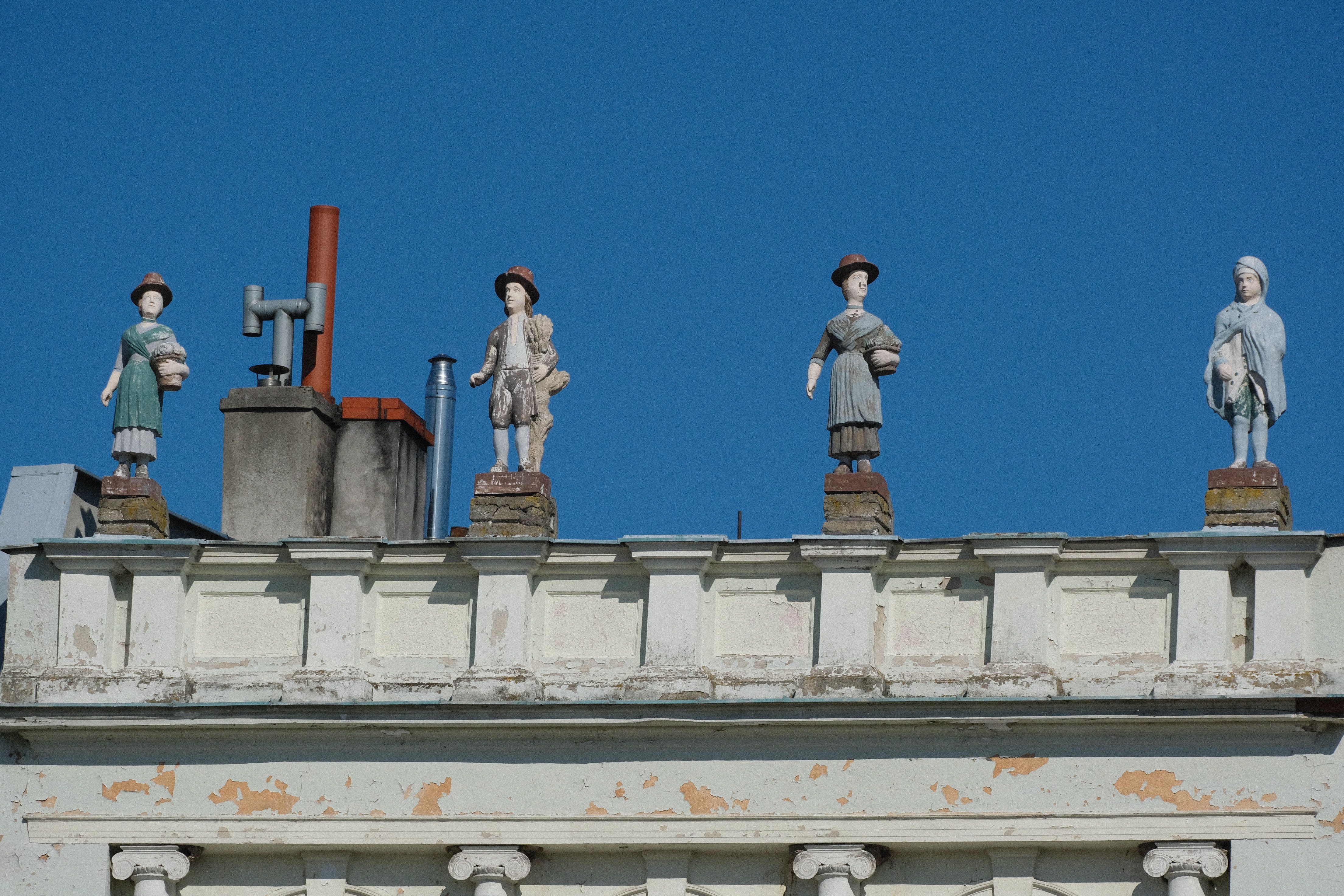 Historic Building with Architectural Statues · Free Stock Photo