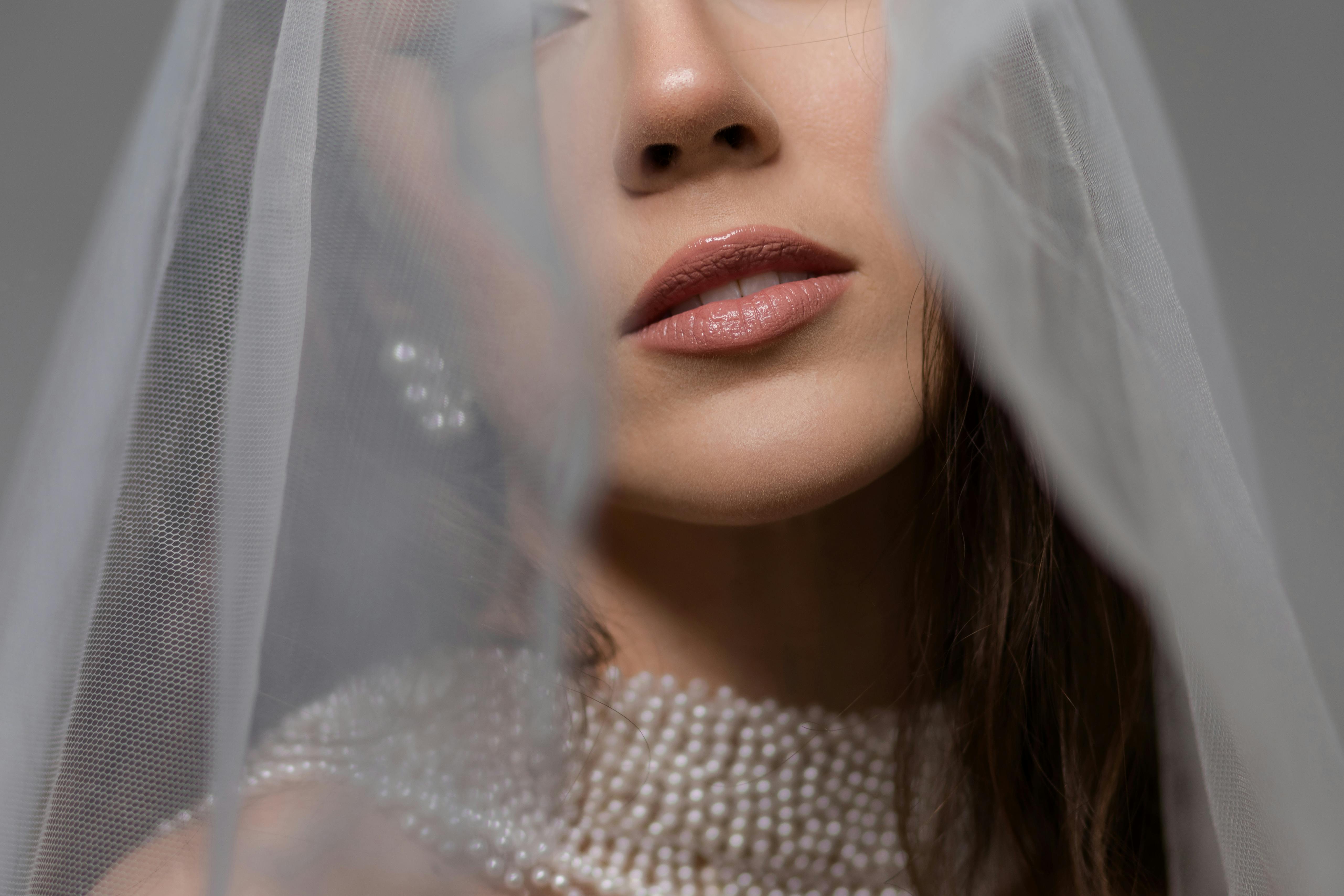 Elegant Bride Veiled in Soft Fabric Close-up · Free Stock Photo