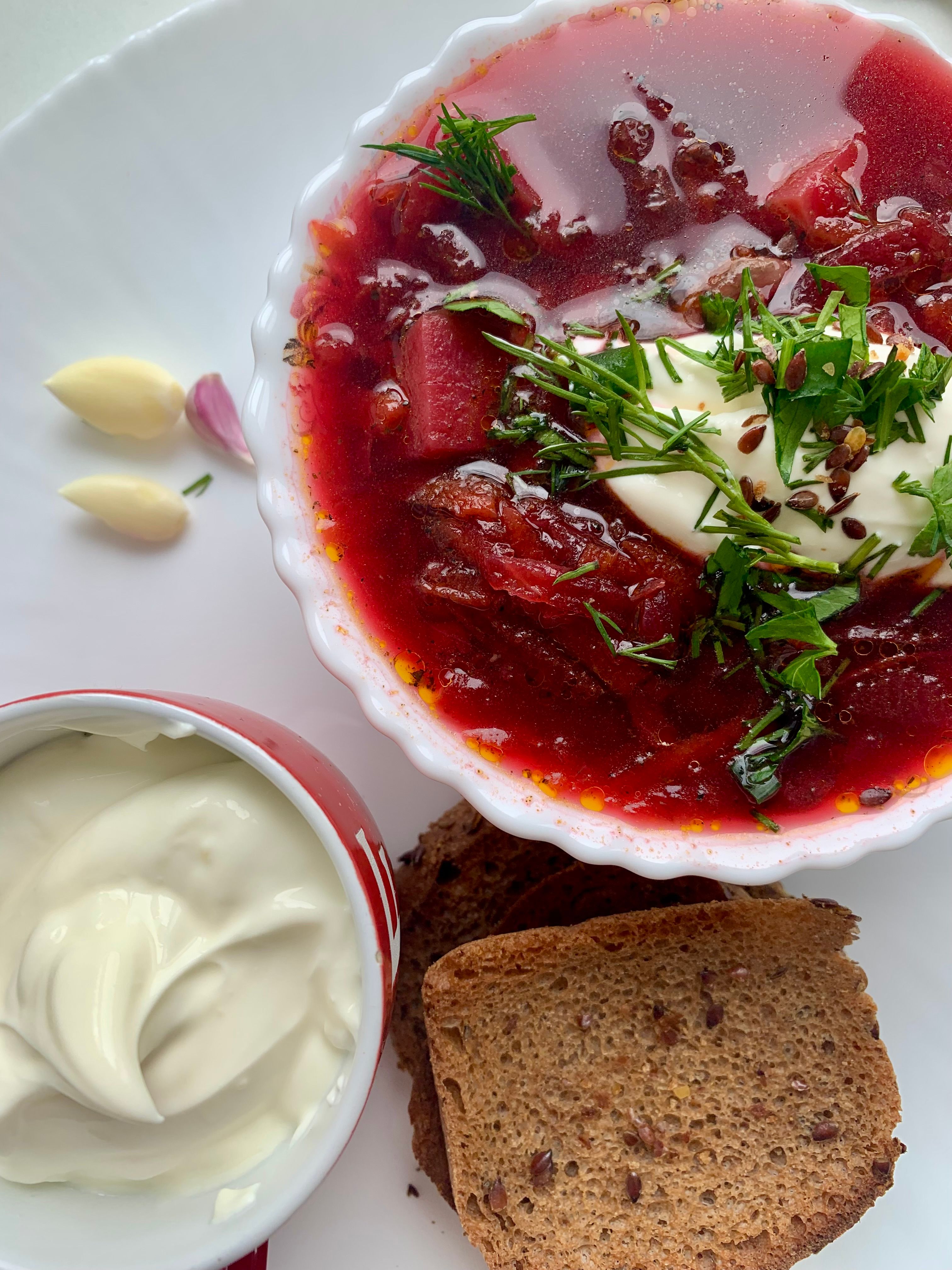 Delicious Russian Borscht with Sour Cream and Bread · Free Stock Photo