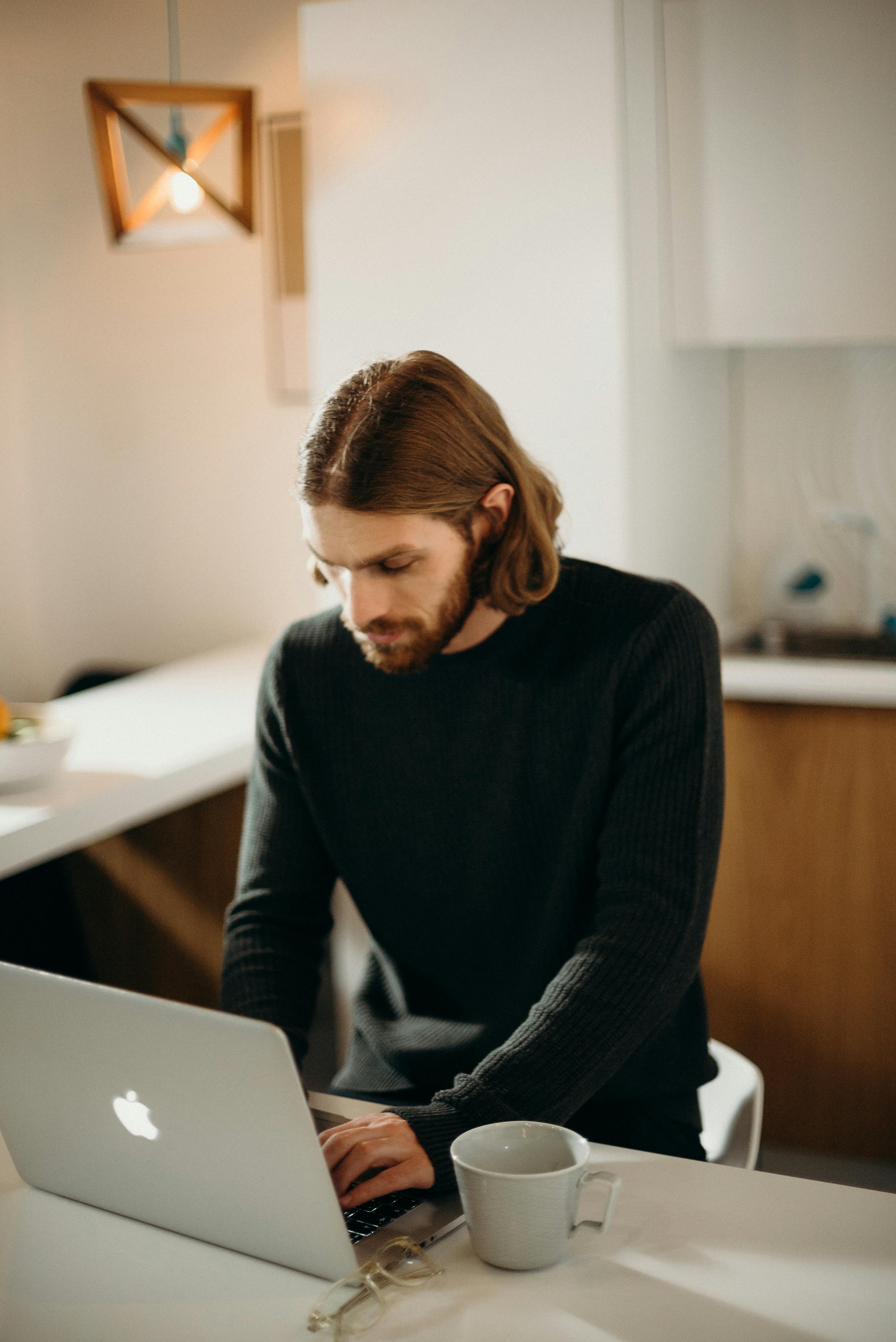 Man Using Macbook · Free Stock Photo