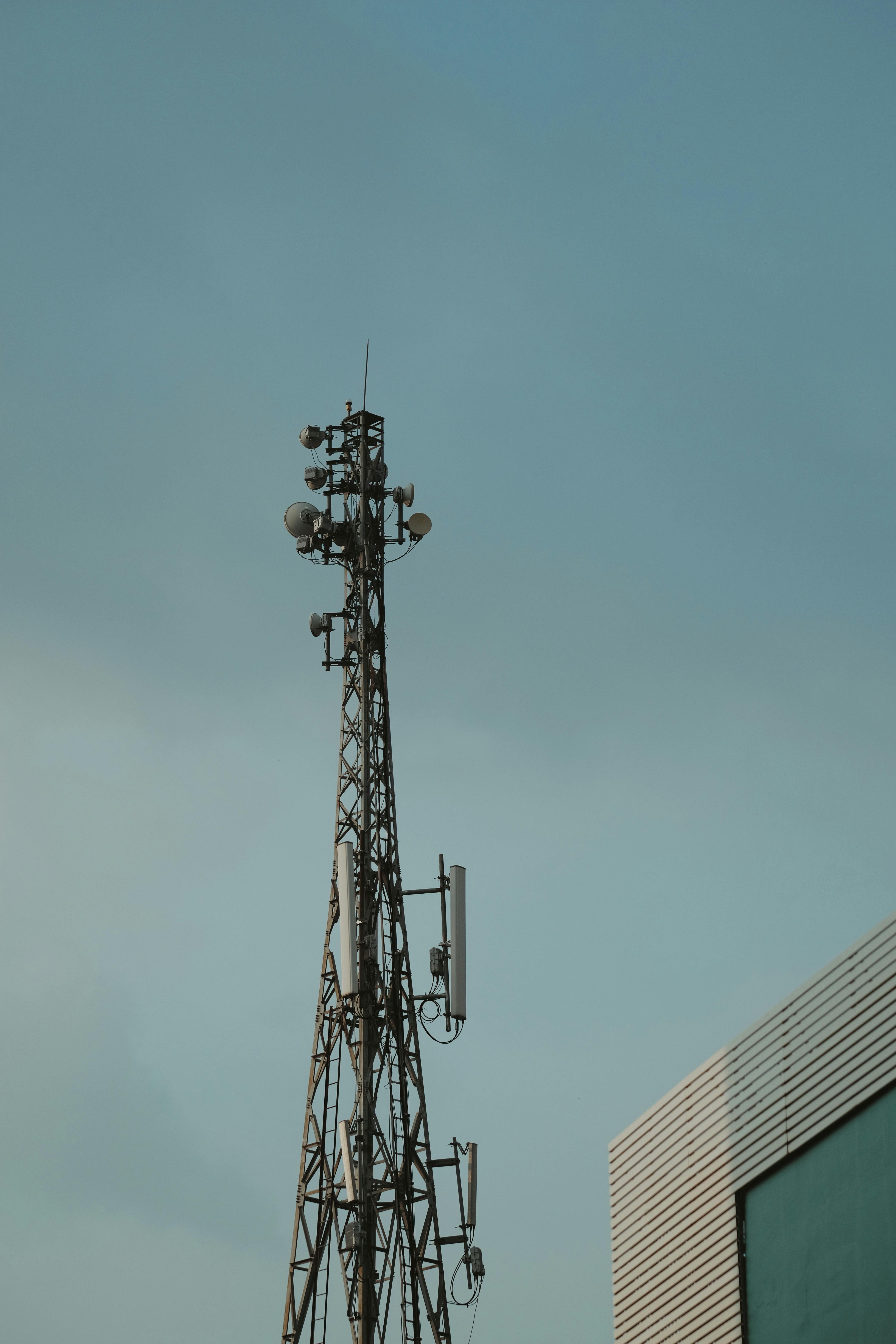 Telecommunication Tower Against Clear Sky · Free Stock Photo