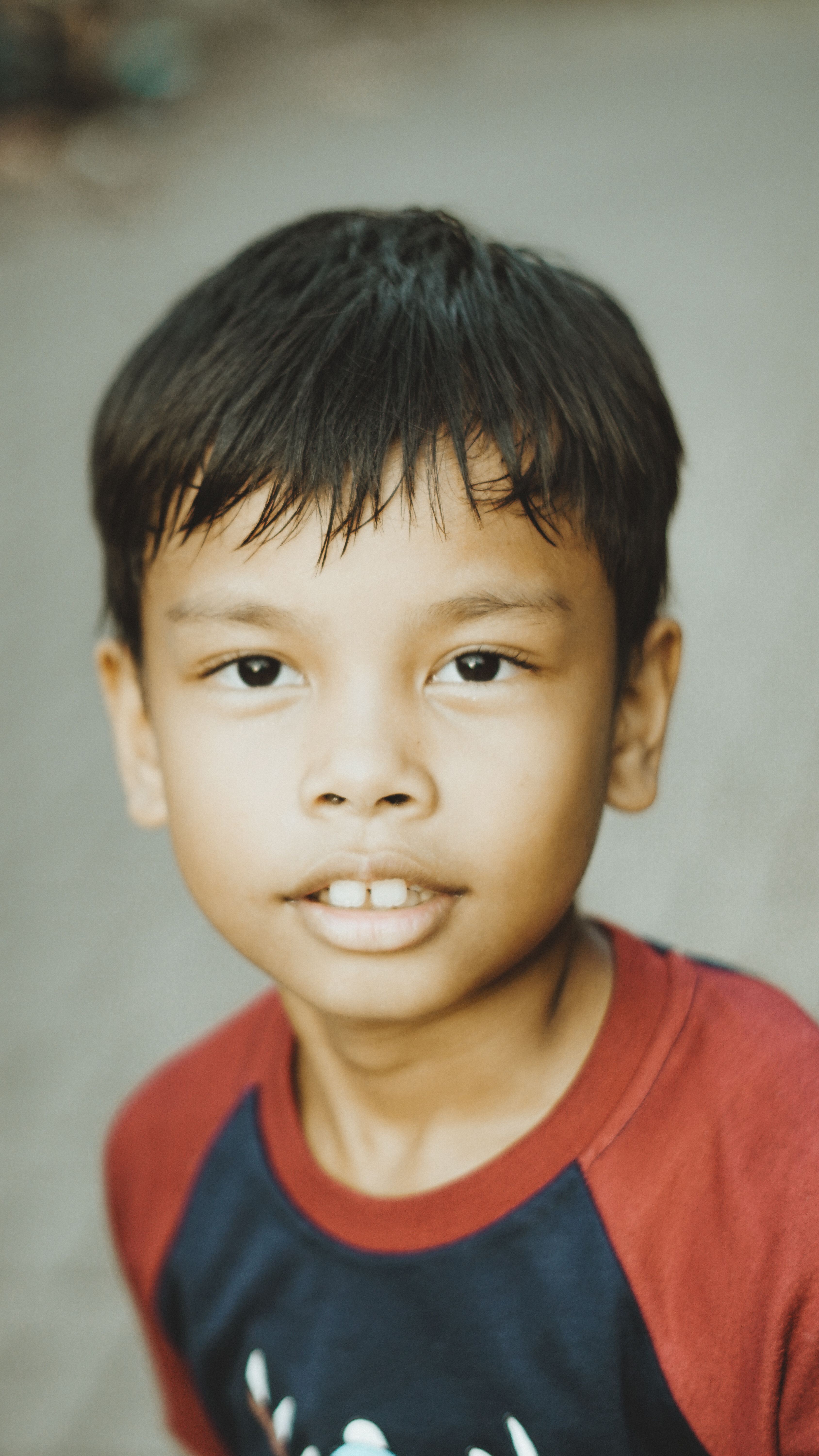 Portrait of a Smiling Child in West Java · Free Stock Photo