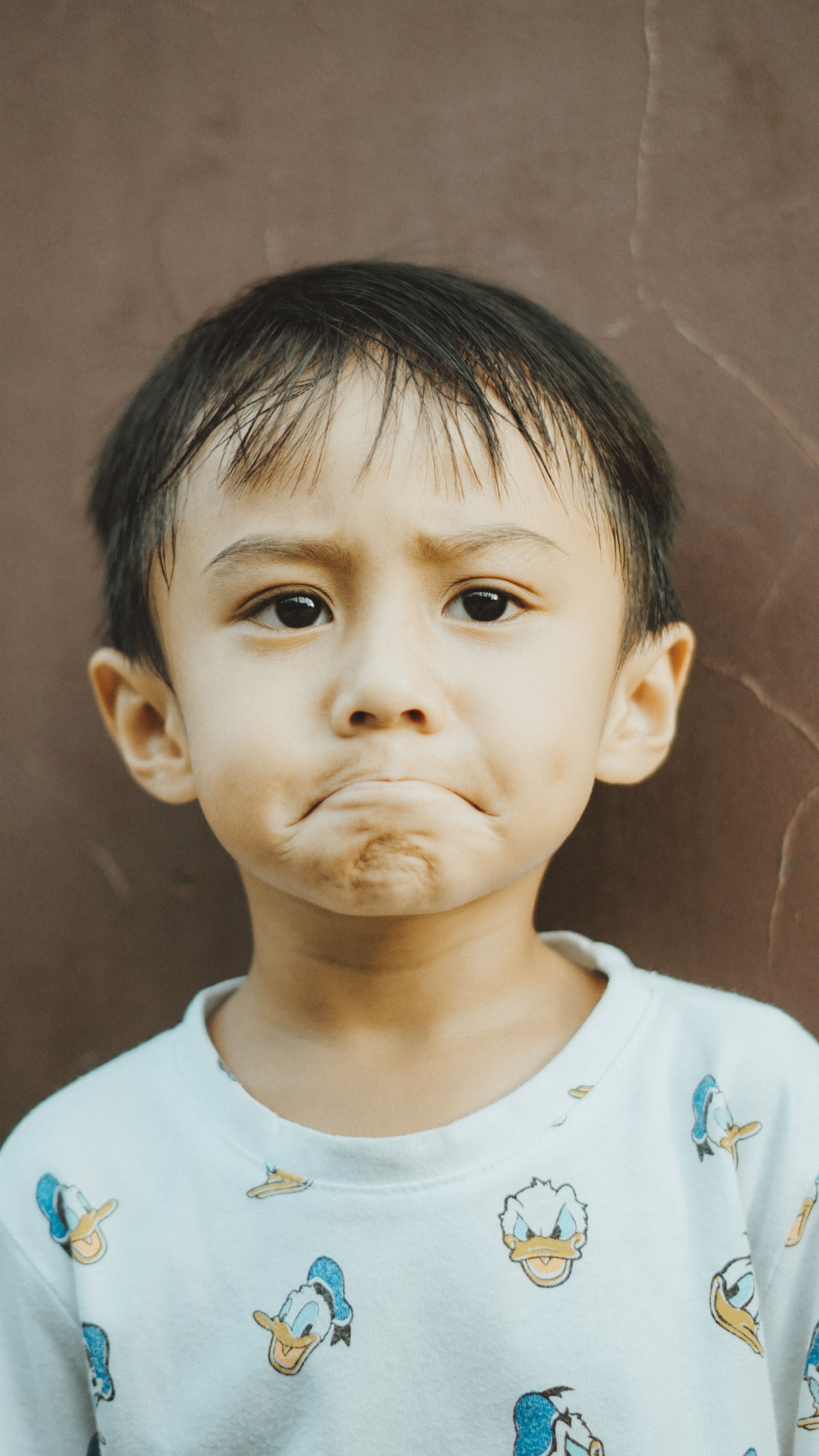 Young Asian Child Portrait with Cute Expression · Free Stock Photo