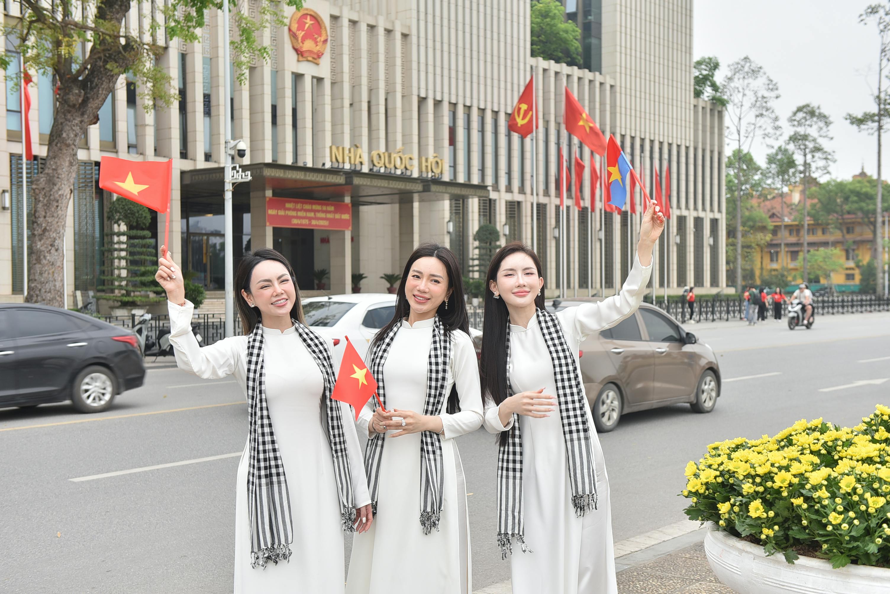 Women Wearing Áo Dài with Flags in Front of Government Building · Free ...