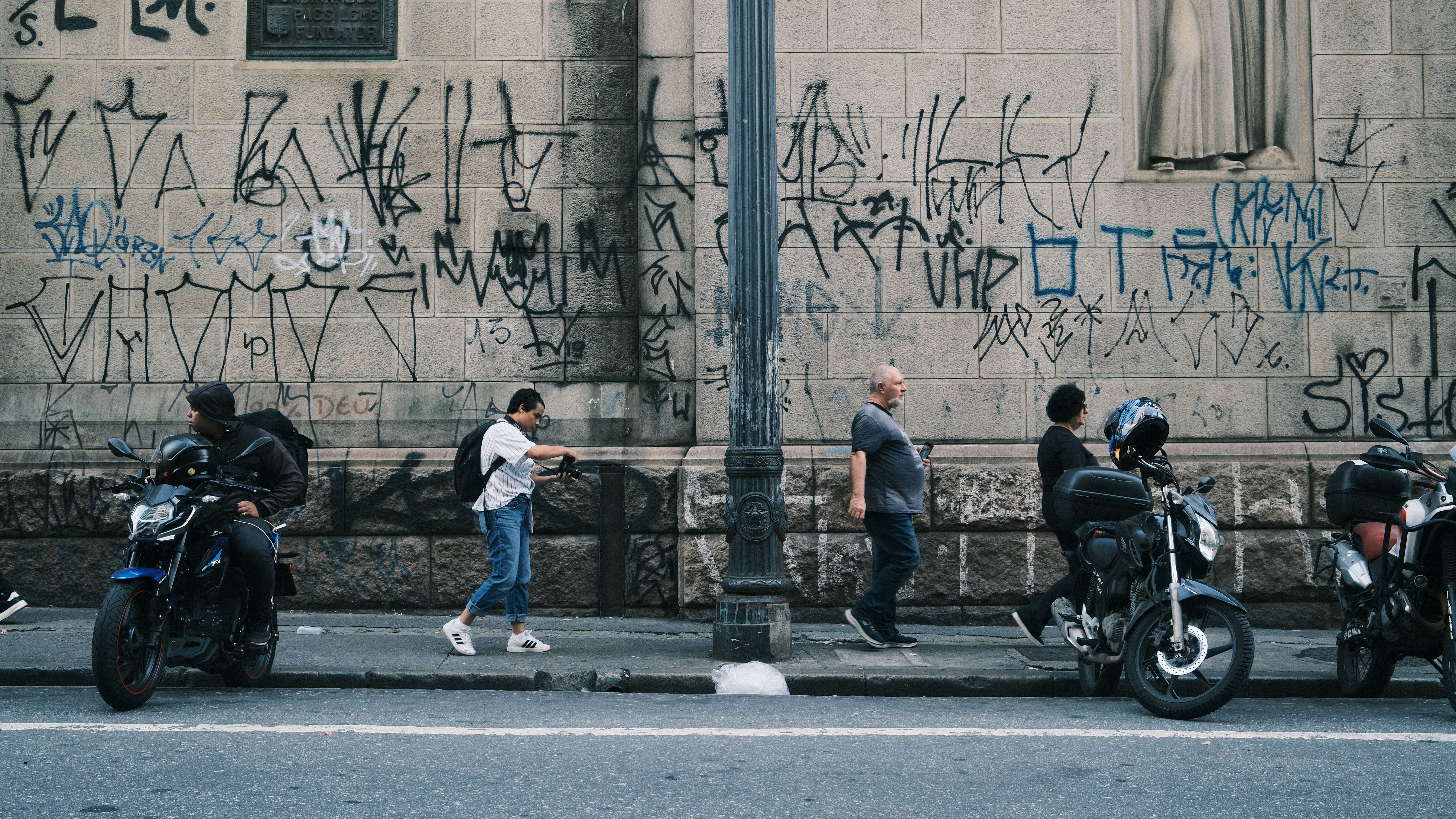 Urban Street Scene with Graffiti and Motorcycles · Free Stock Photo