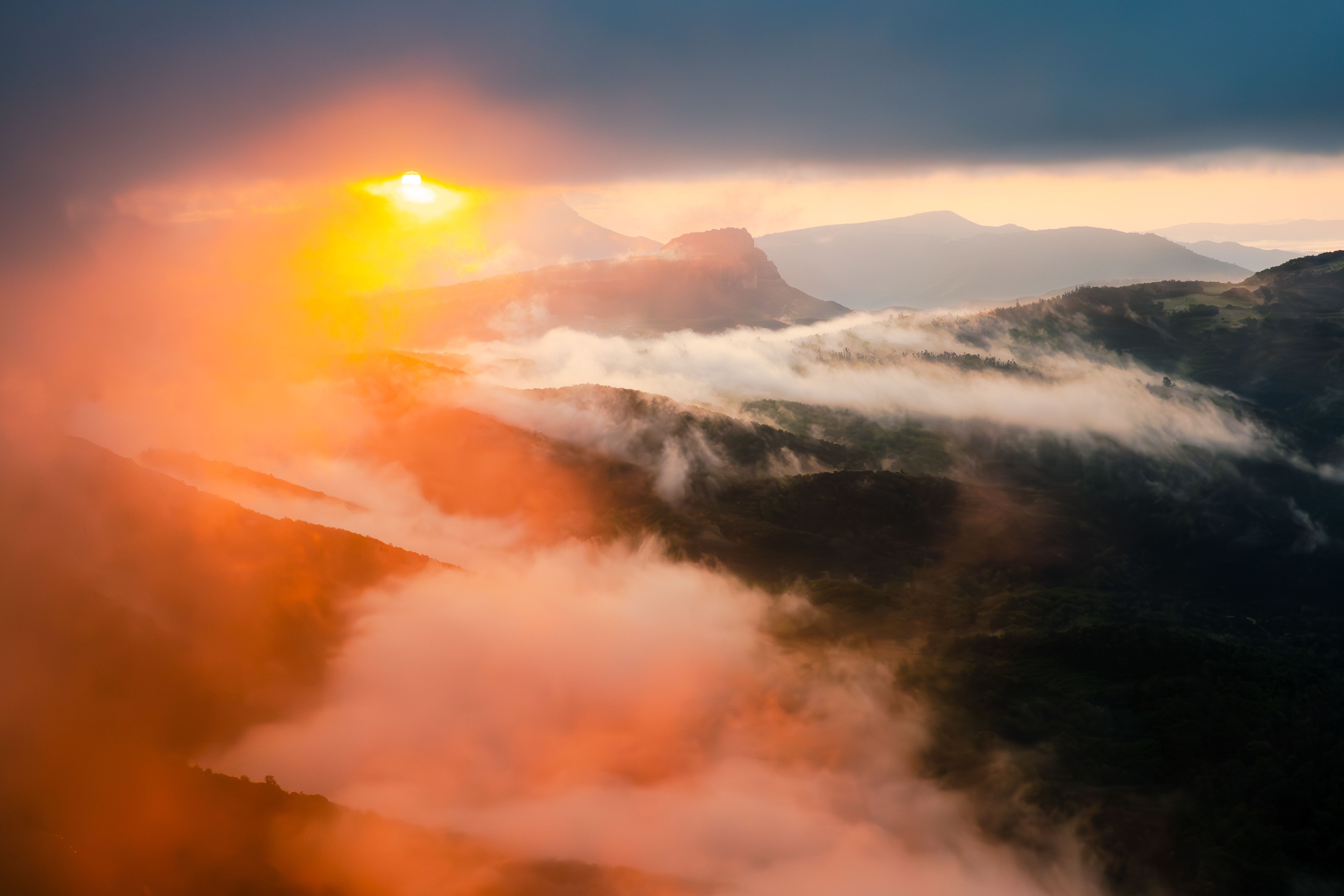 Dramatic Mountain Sunrise with Fog and Clouds · Free Stock Photo