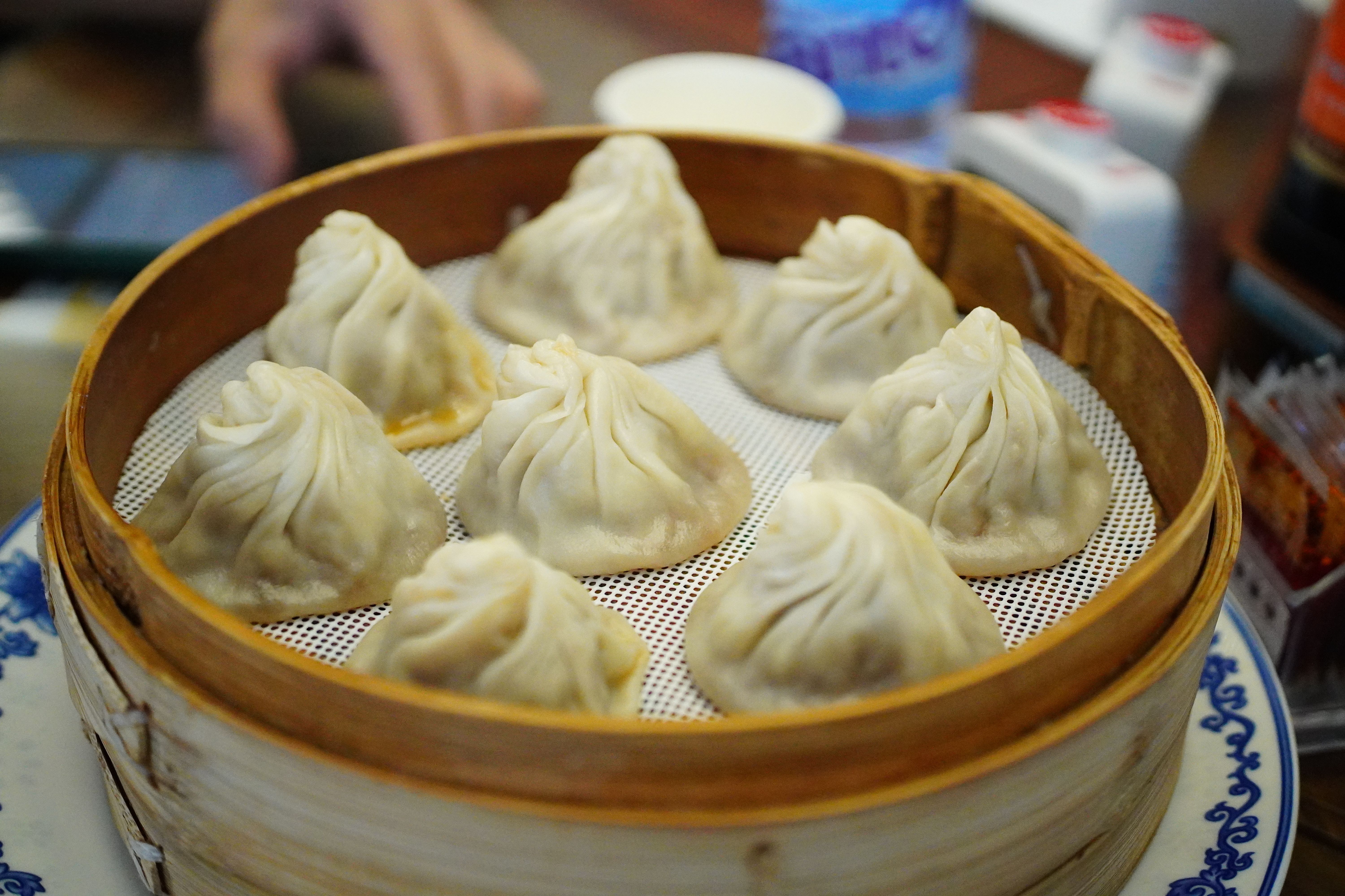 Traditional Steamed Chinese Dumplings in Bamboo Basket · Free Stock Photo