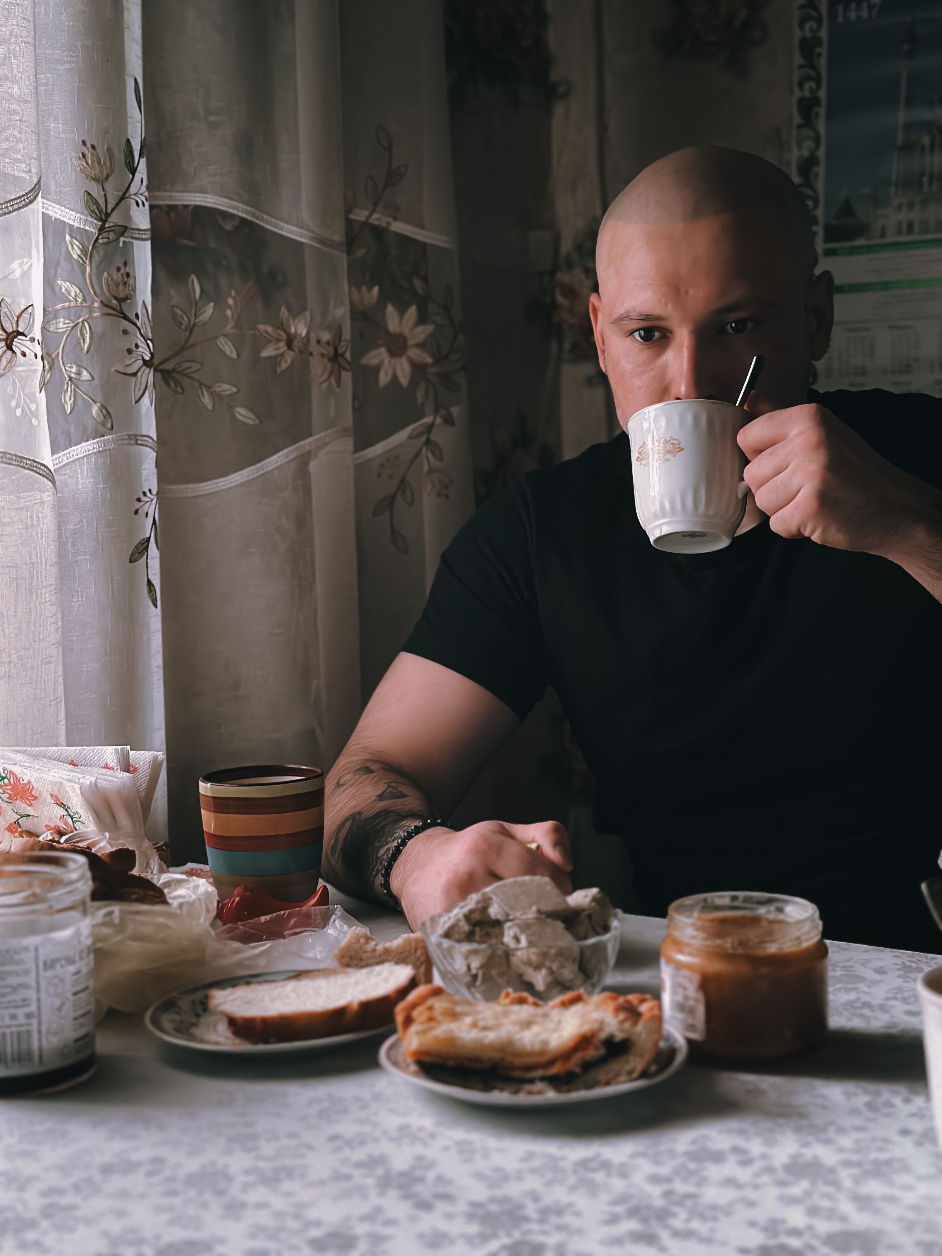 Cozy Breakfast Scene with Man in Vintage Kitchen · Free Stock Photo