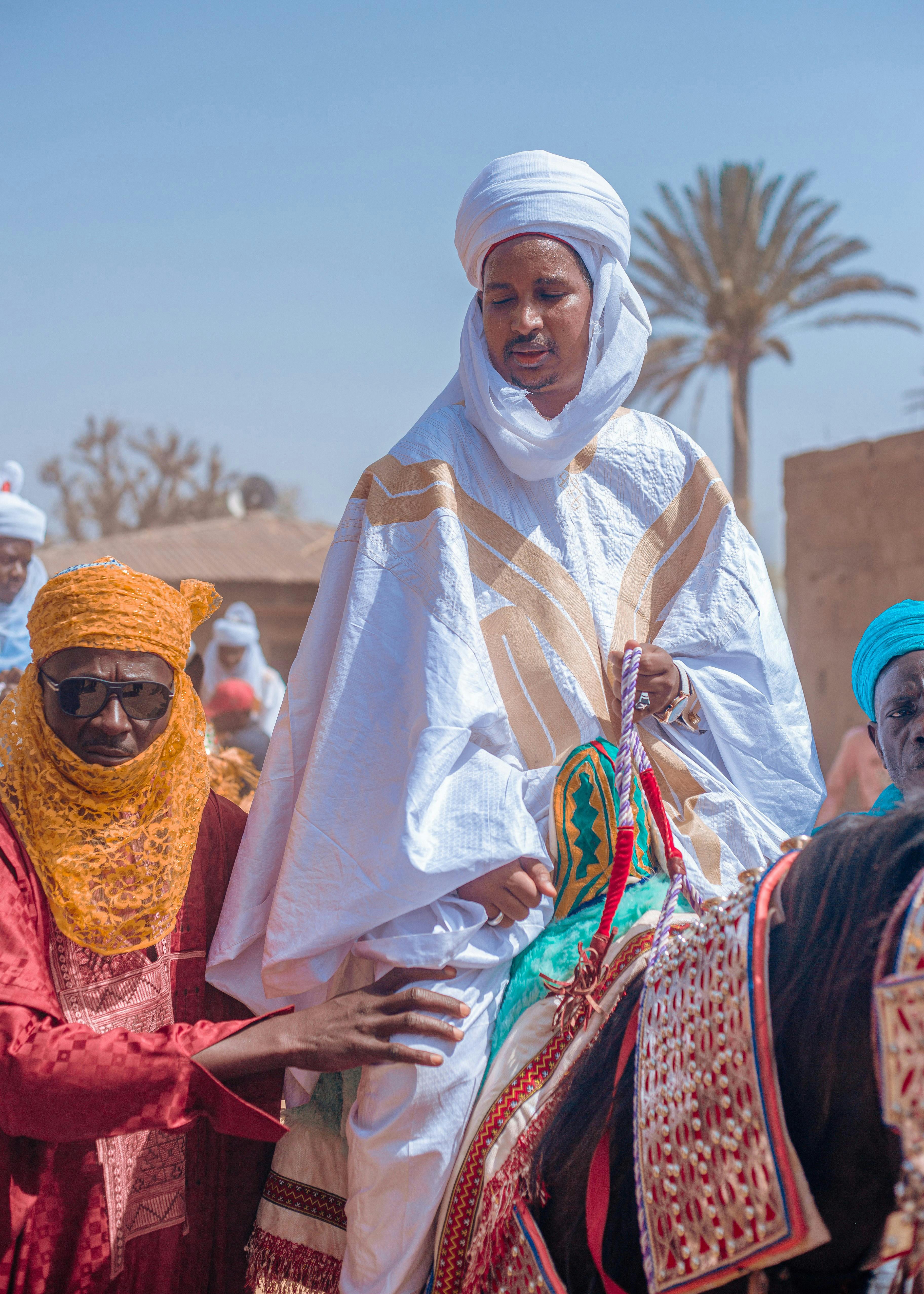 African Cultural Ceremony with Traditional Attire · Free Stock Photo