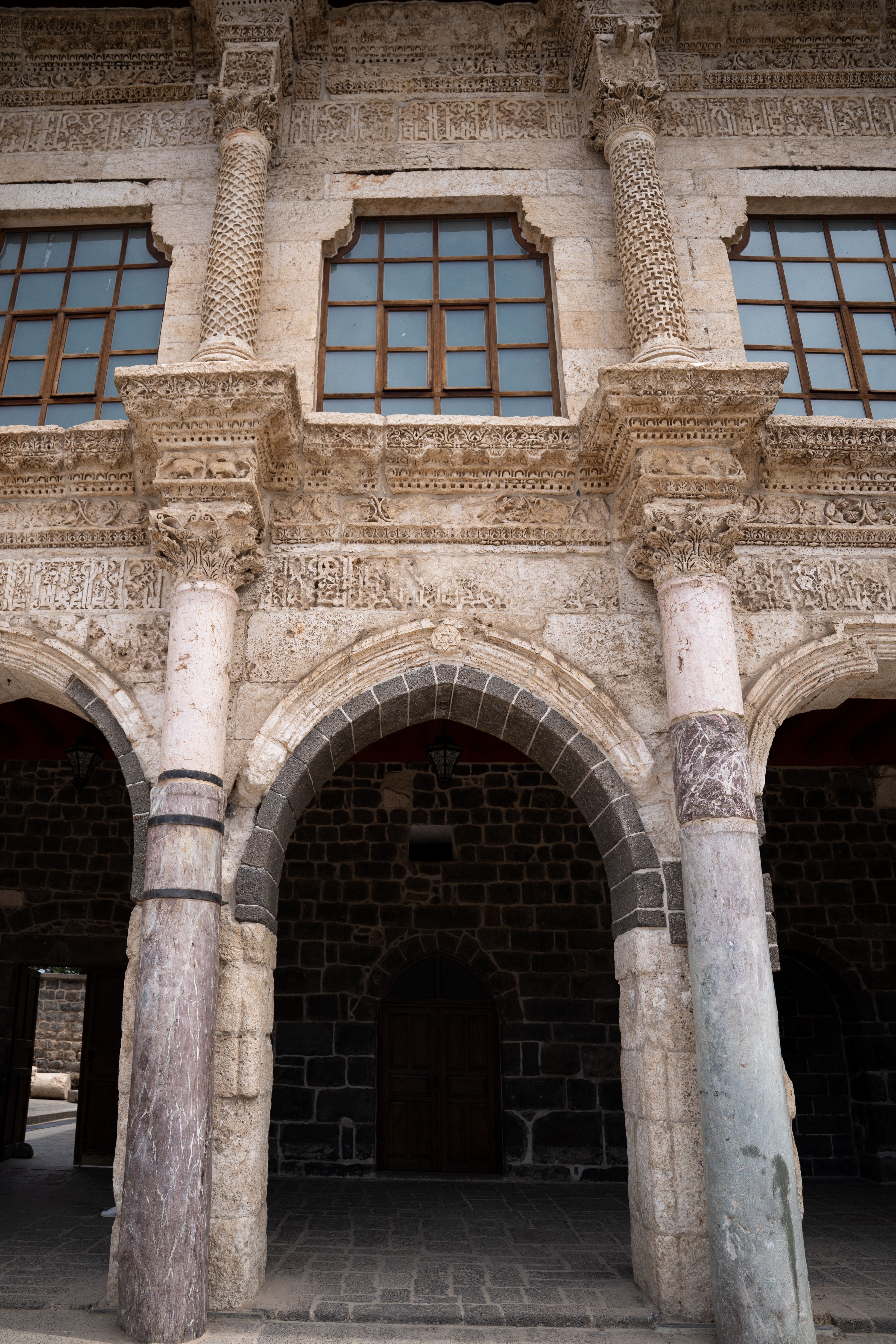 Historic Stone Architecture with Arched Entrance · Free Stock Photo