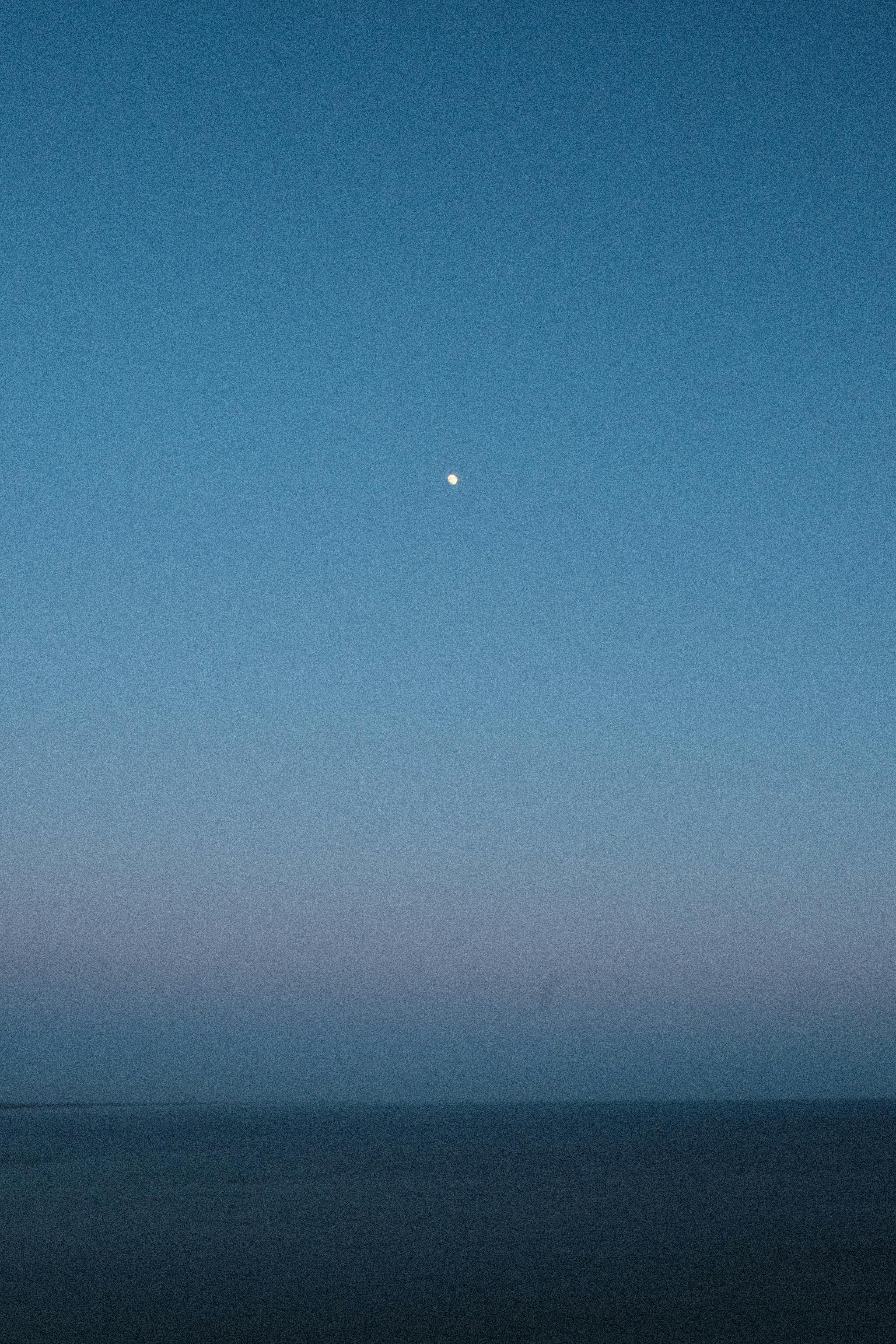 Tranquil Night Sky Over Calm Ocean · Free Stock Photo