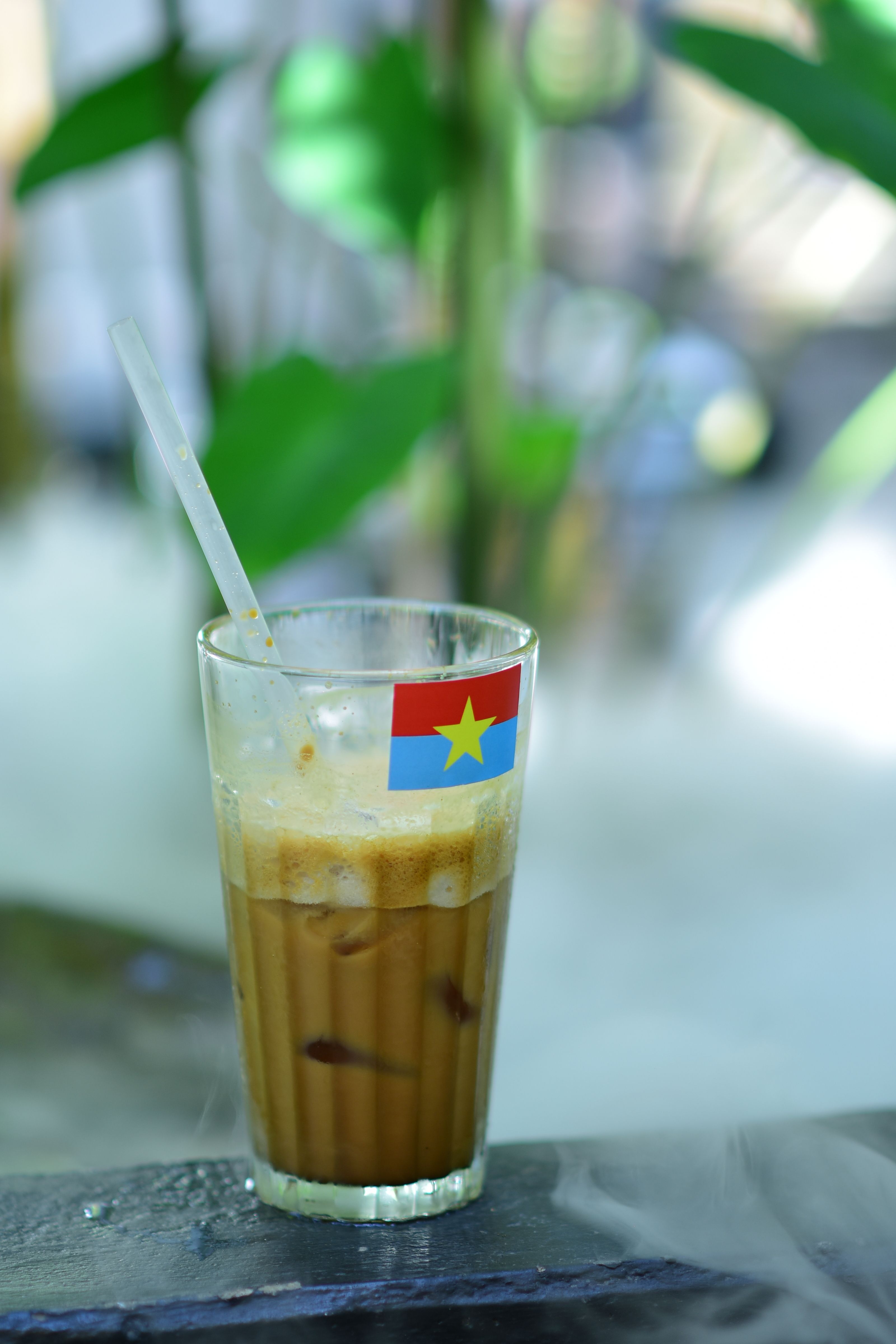 Refreshing Iced Coffee in a Tropical Setting · Free Stock Photo
