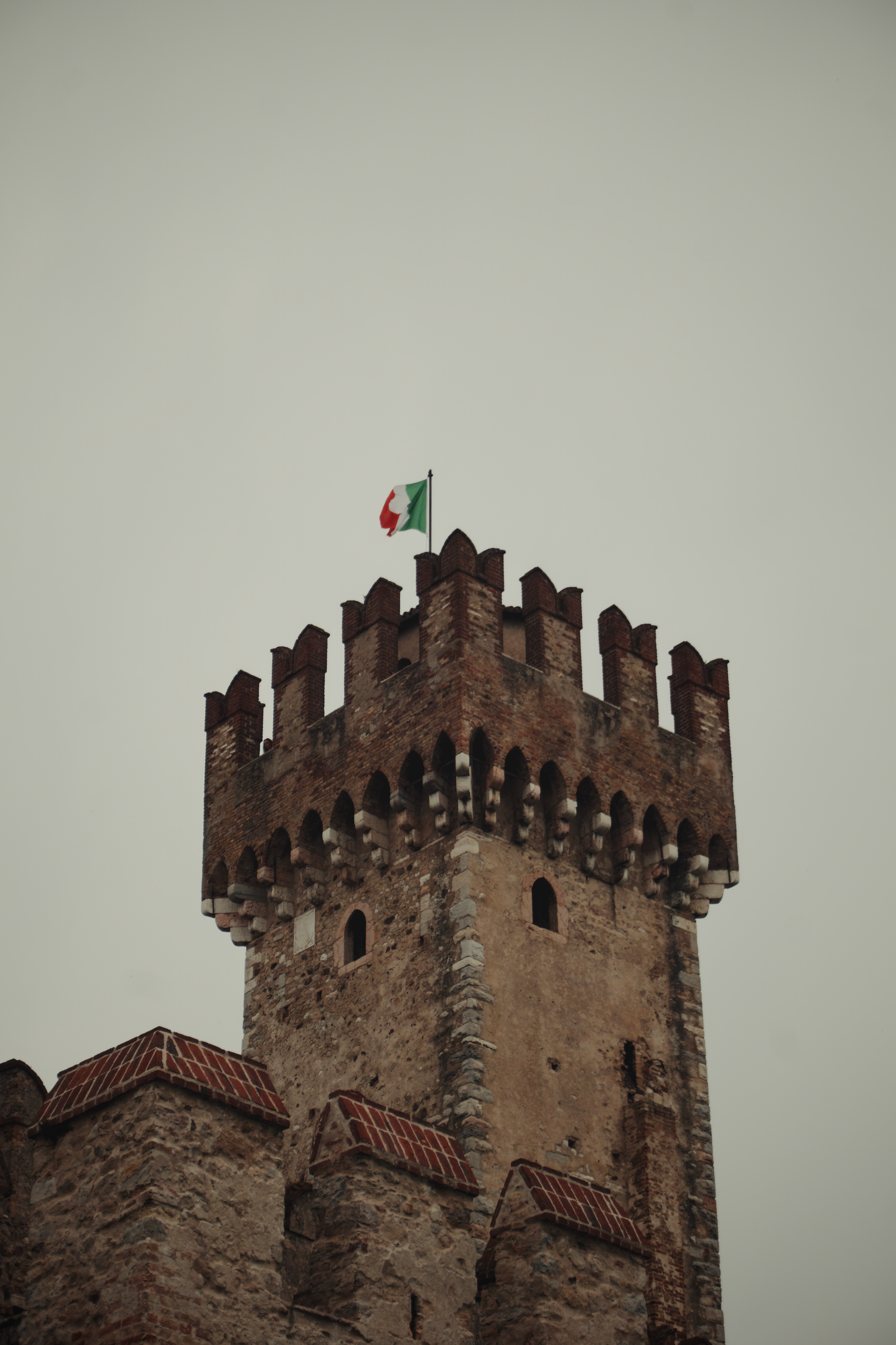 Medieval Castle Tower with Italian Flag · Free Stock Photo